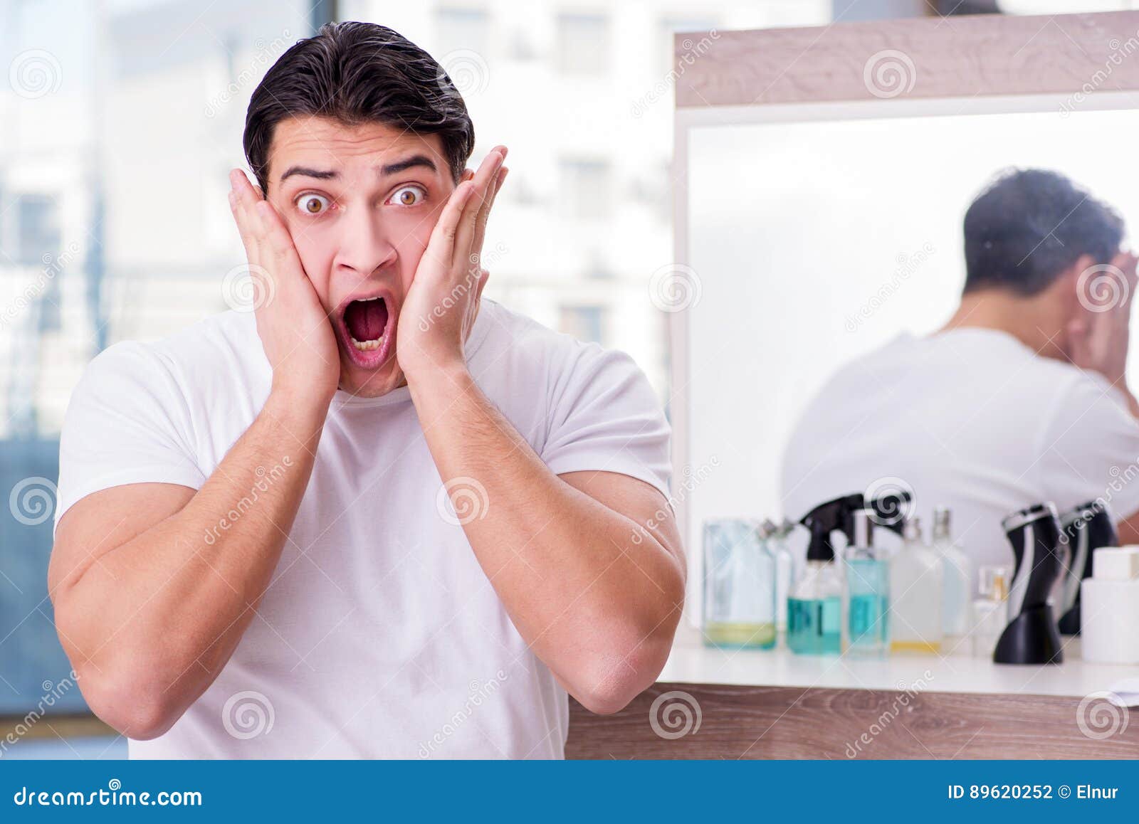 The Young Handsome Man Applying Face Cream Stock Photo - Image of ...