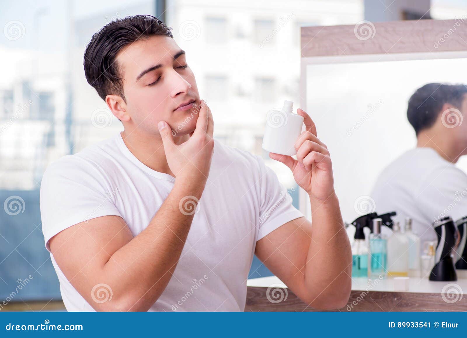 The Young Handsome Man Applying Face Cream Stock Image - Image of ...