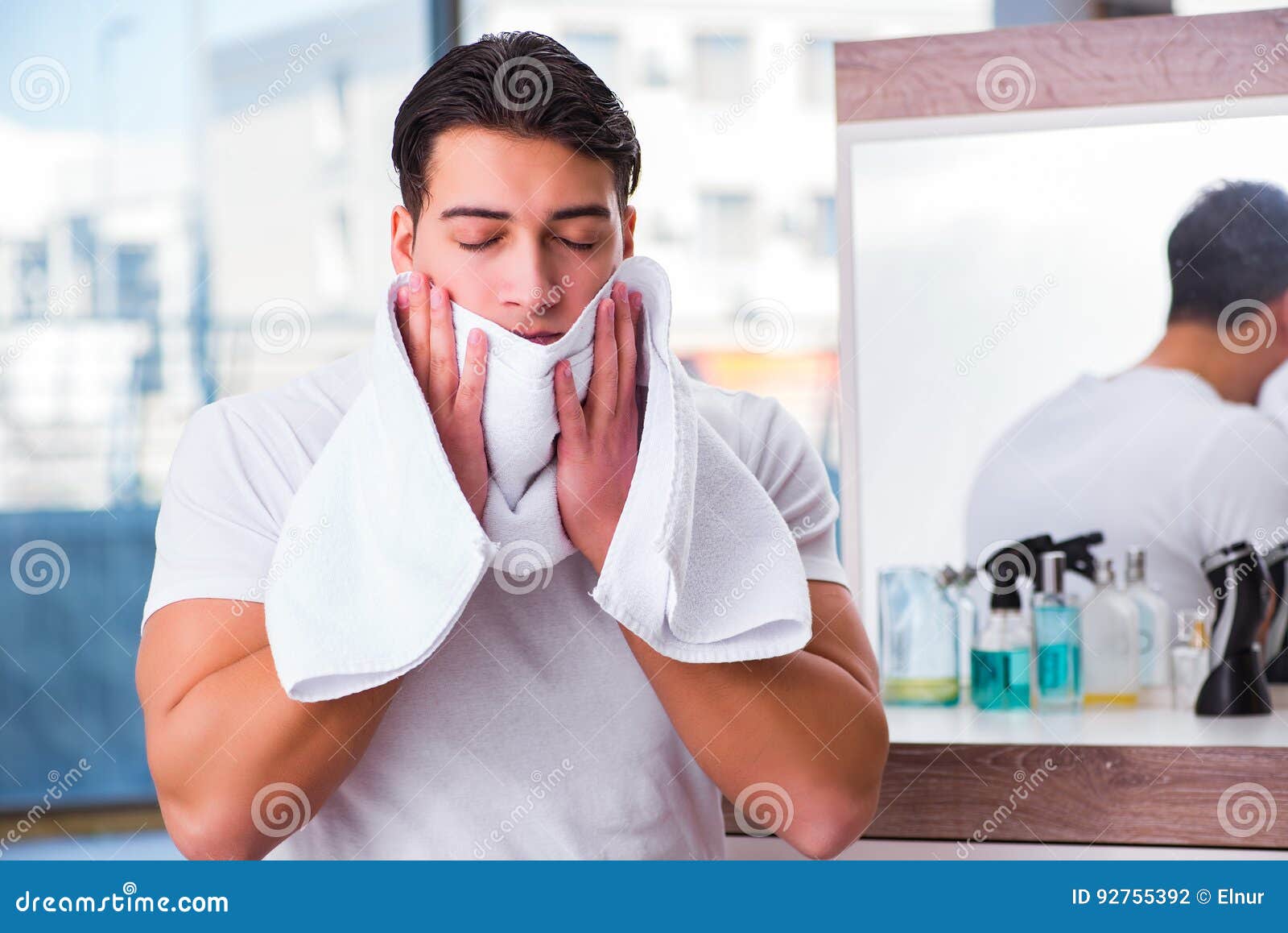 The Young Handsome Man Applying Face Cream Stock Photo - Image of ...