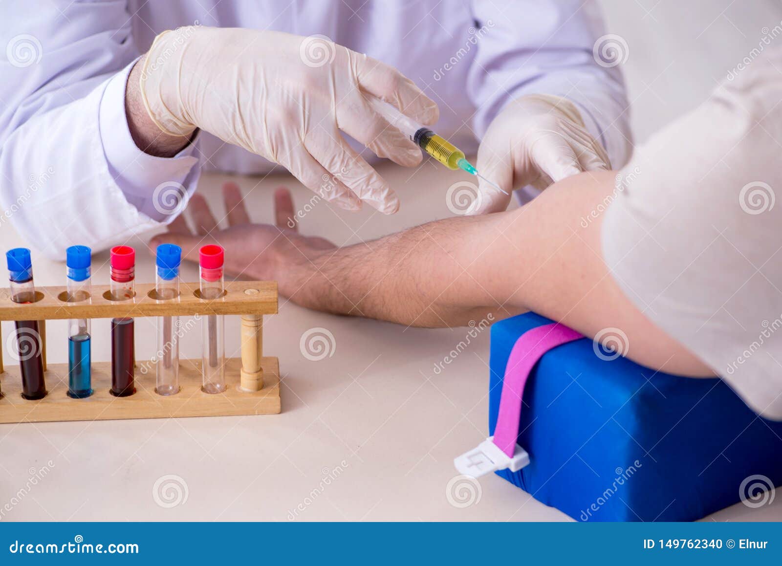 Young Handsome Man during Blood Test Sampling Procedure Stock Photo ...