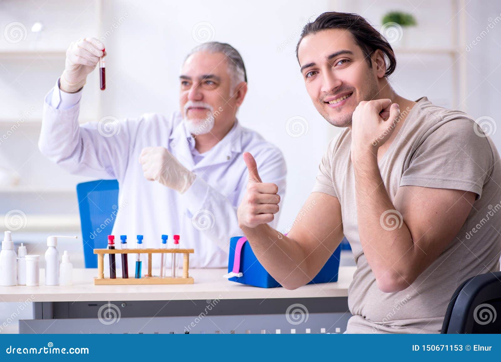 The Young Handsome Man during Blood Test Sampling Procedure Stock Image ...
