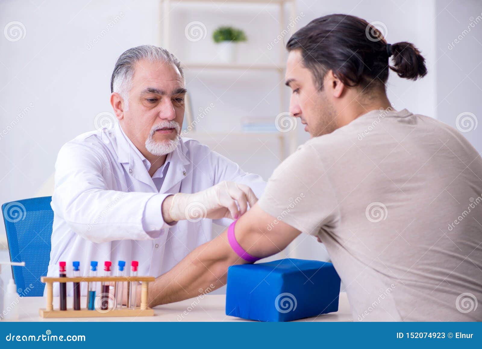 Young Handsome Man during Blood Test Sampling Procedure Stock Image ...