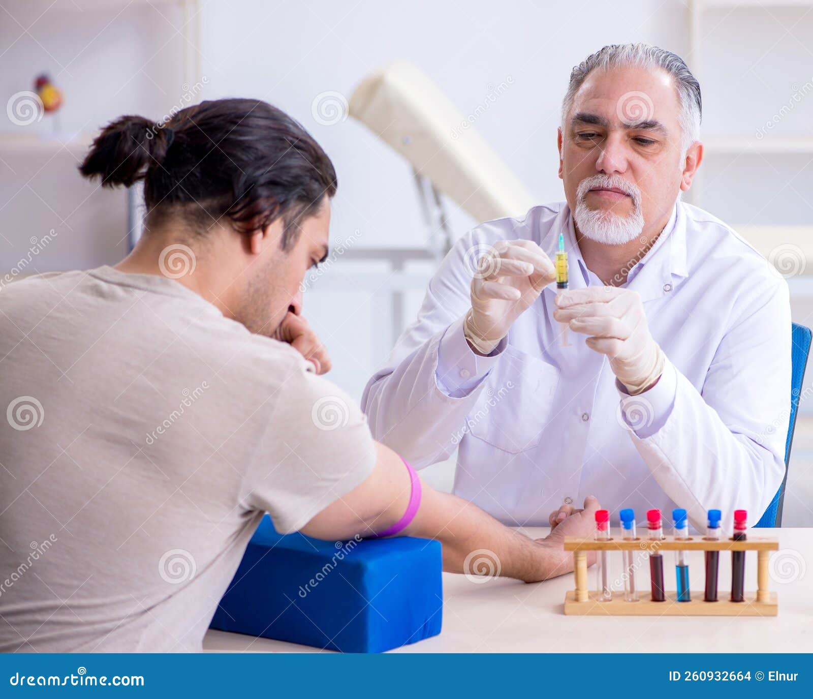 Young Handsome Man during Blood Test Sampling Procedure Stock Photo ...