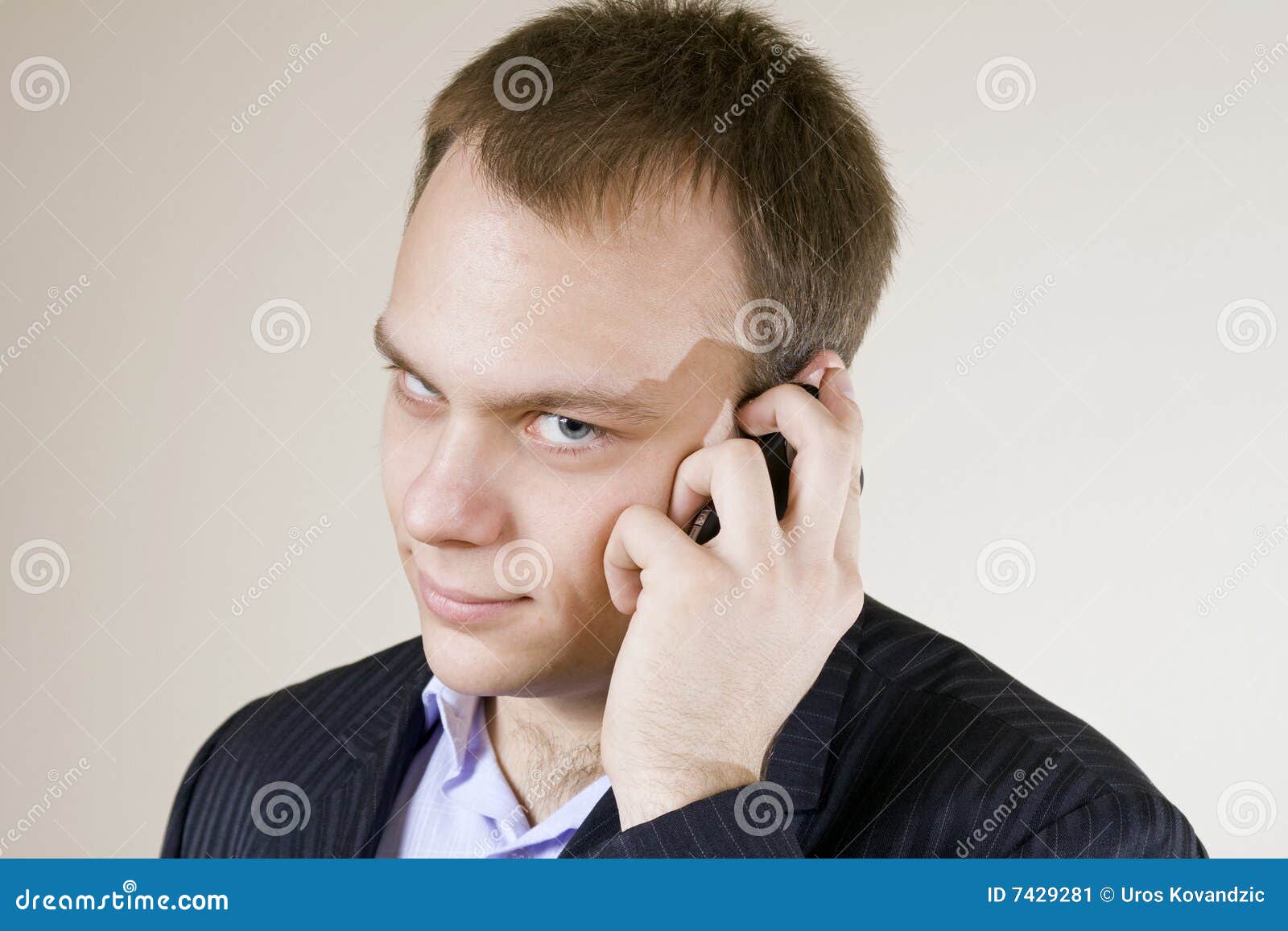 Young Handsome Man on the Cellphone Stock Image - Image of collar, chat ...