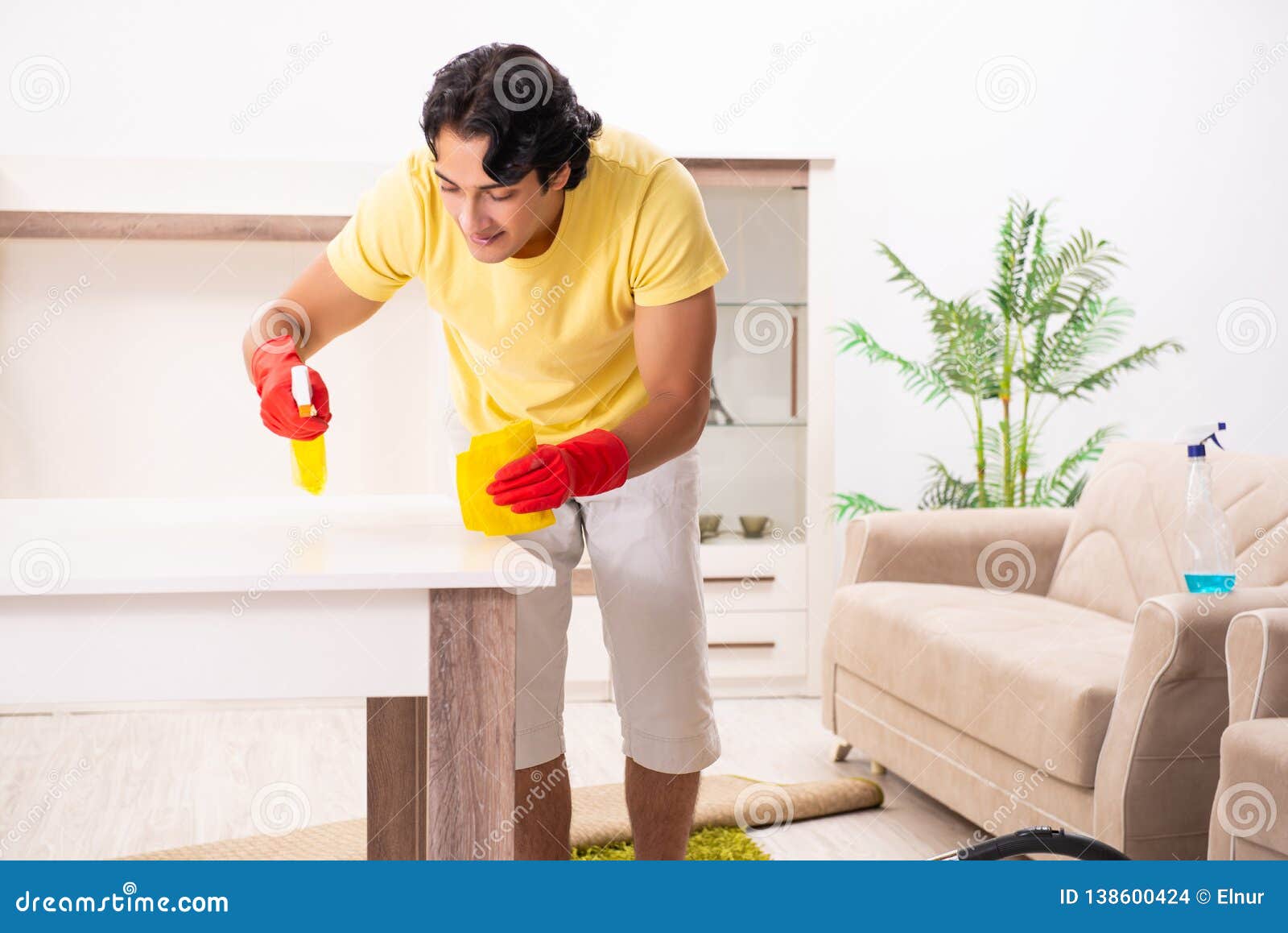 The Young Handsome Man Doing Housework Stock Photo - Image of dusty ...