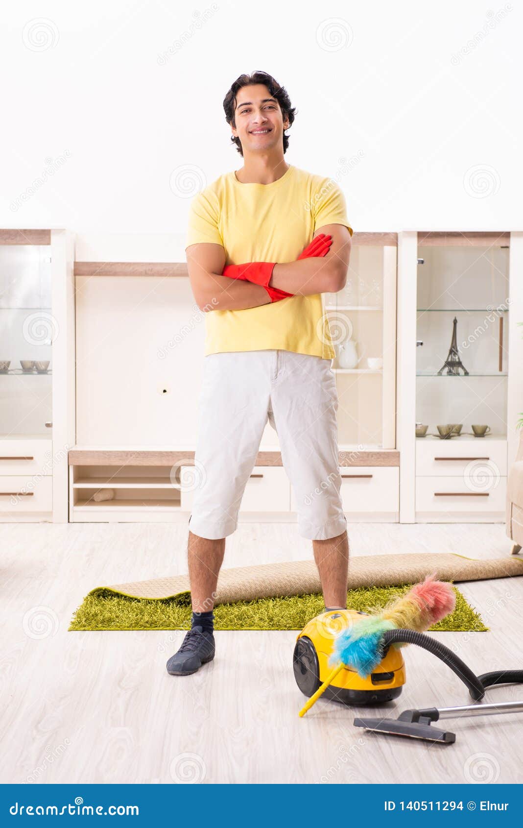 The Young Handsome Man Doing Housework Stock Photo - Image of feather ...