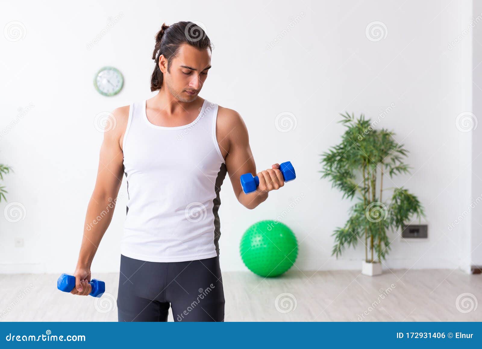 Young Handsome Man Doing Sport Exercises Indoors Stock Photo - Image of ...