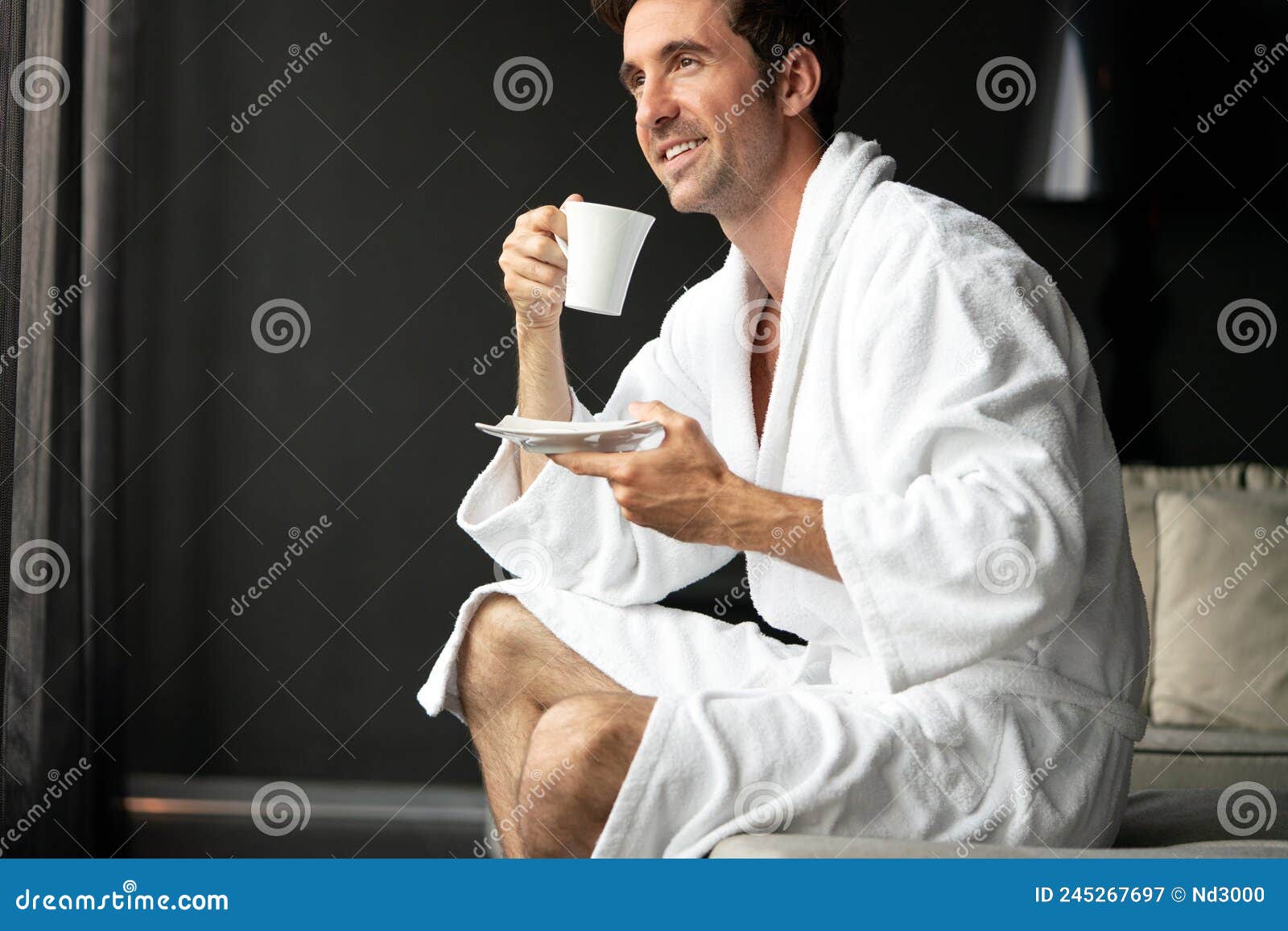 Young Handsome Man Drinking Morning Coffee in Bathrobe Stock Image ...