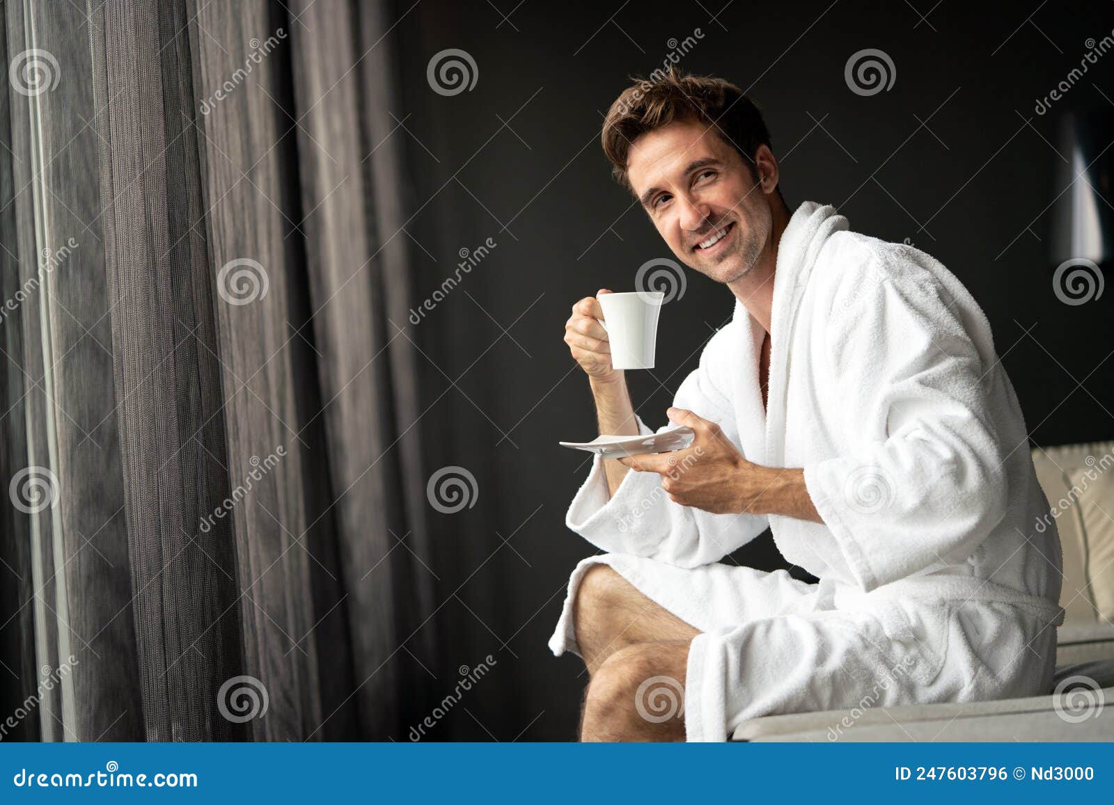Young Handsome Man Drinking Morning Coffee in Bathrobe Stock Photo ...