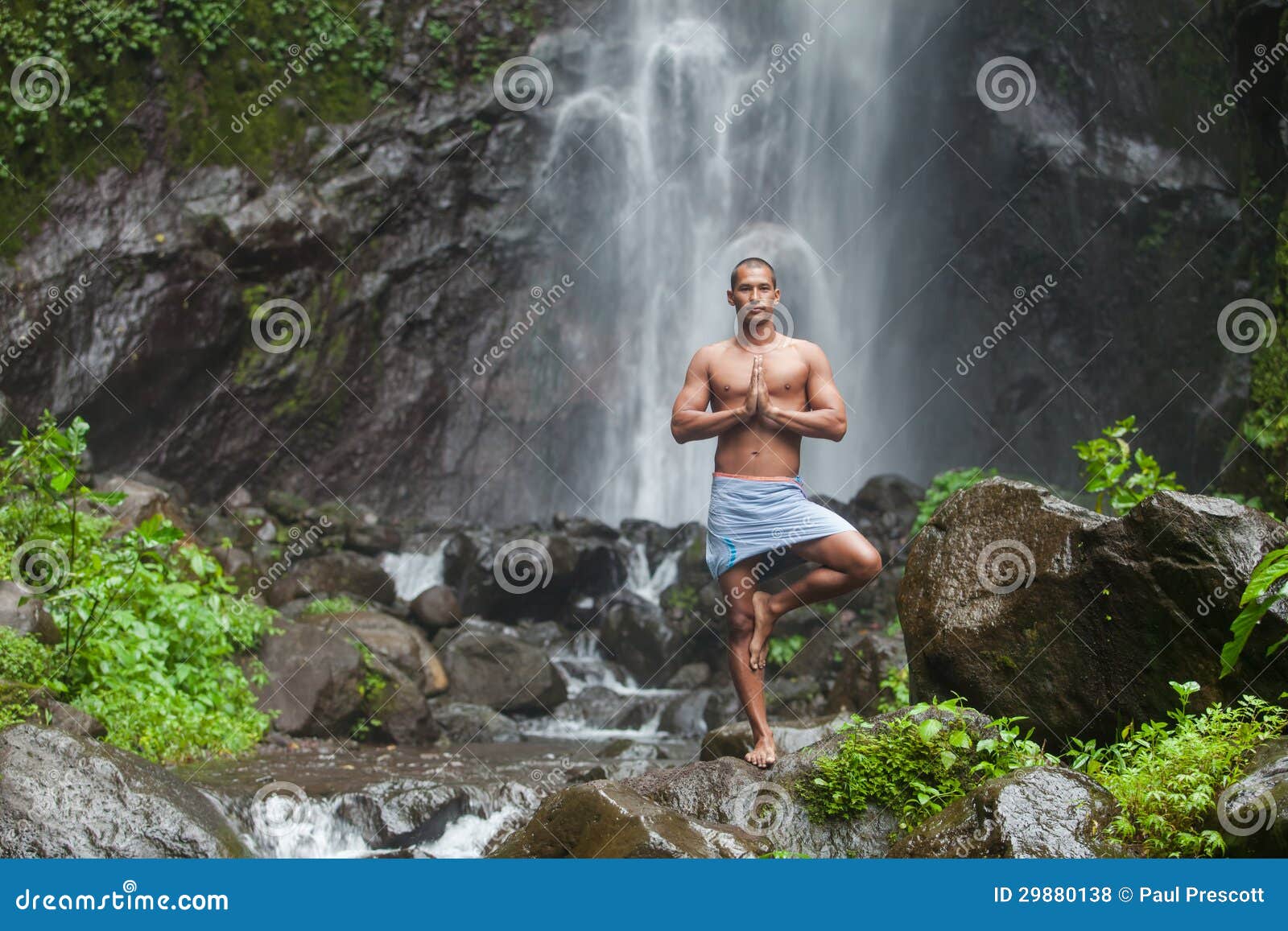 Handsome man at waterfall stock photo. Image of bali - 29880138