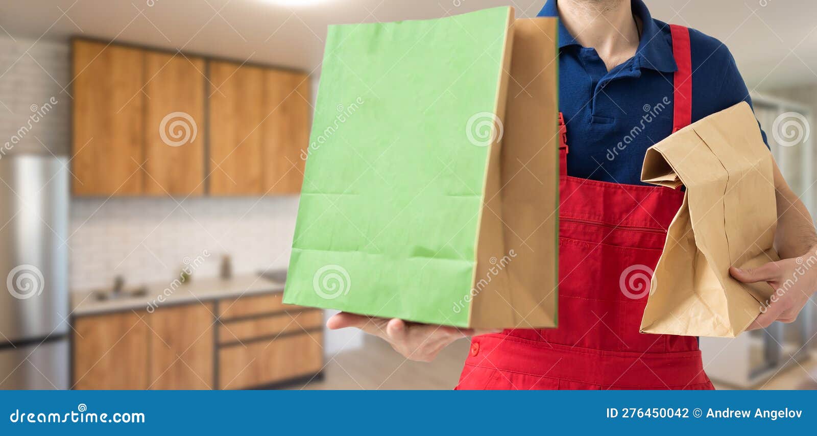 Young Handsome Man Holding Delivery Paper Bag Stock Photo - Image of ...