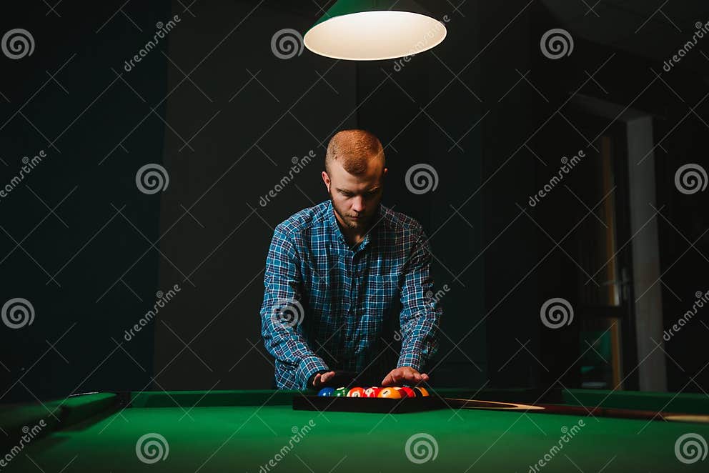 Young Handsome Man Leaning Over the Table while Playing Snooker Stock ...