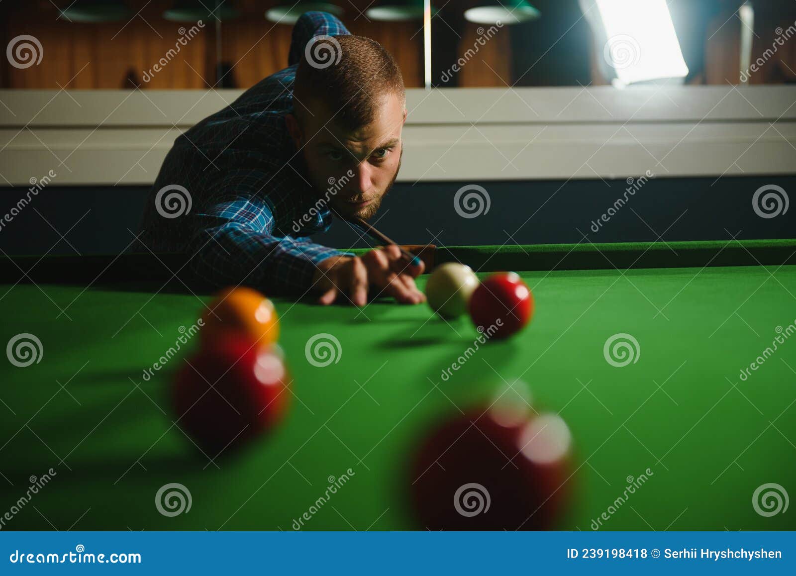 Young Handsome Man Leaning Over the Table while Playing Snooker Stock ...
