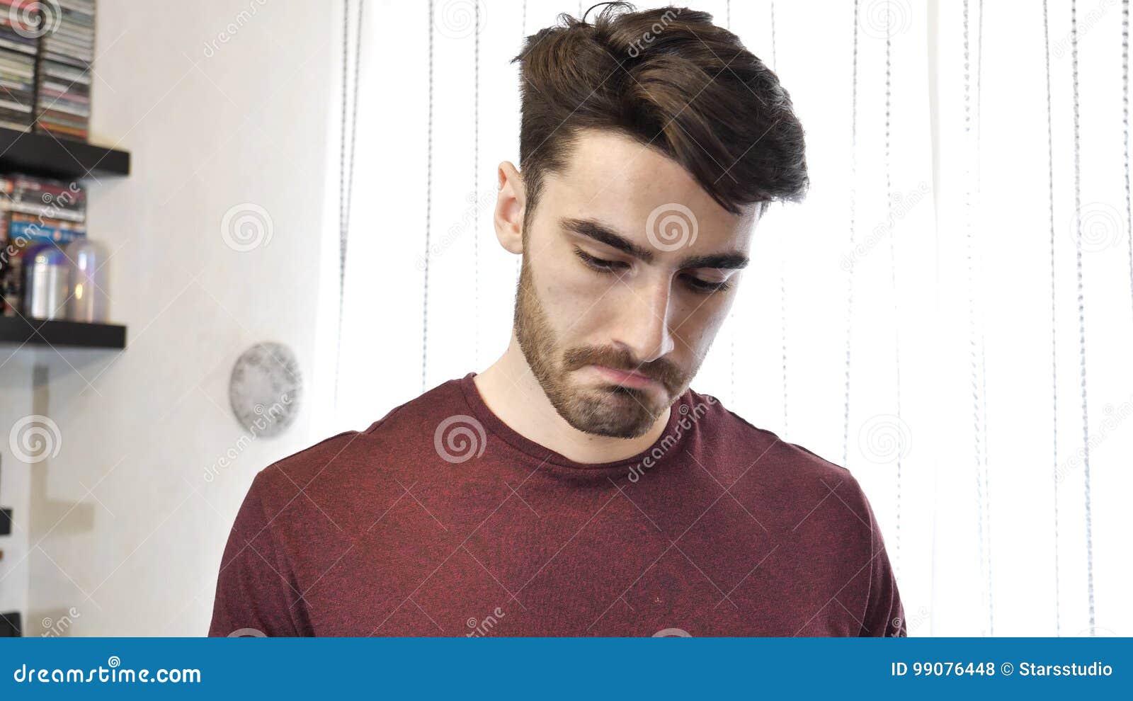 Young Man Looking Down Sad with Pouting Lips Stock Photo - Image of ...