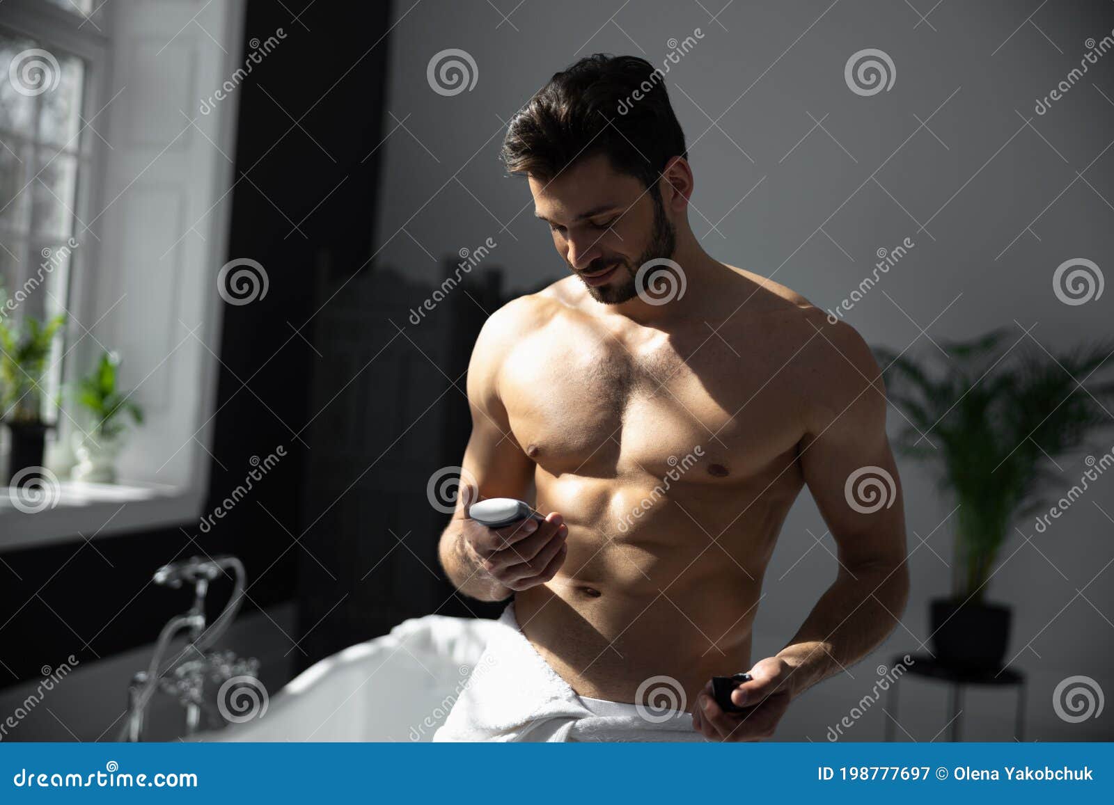Young Handsome Man Applying Deodorant Stock Image - Image of male ...