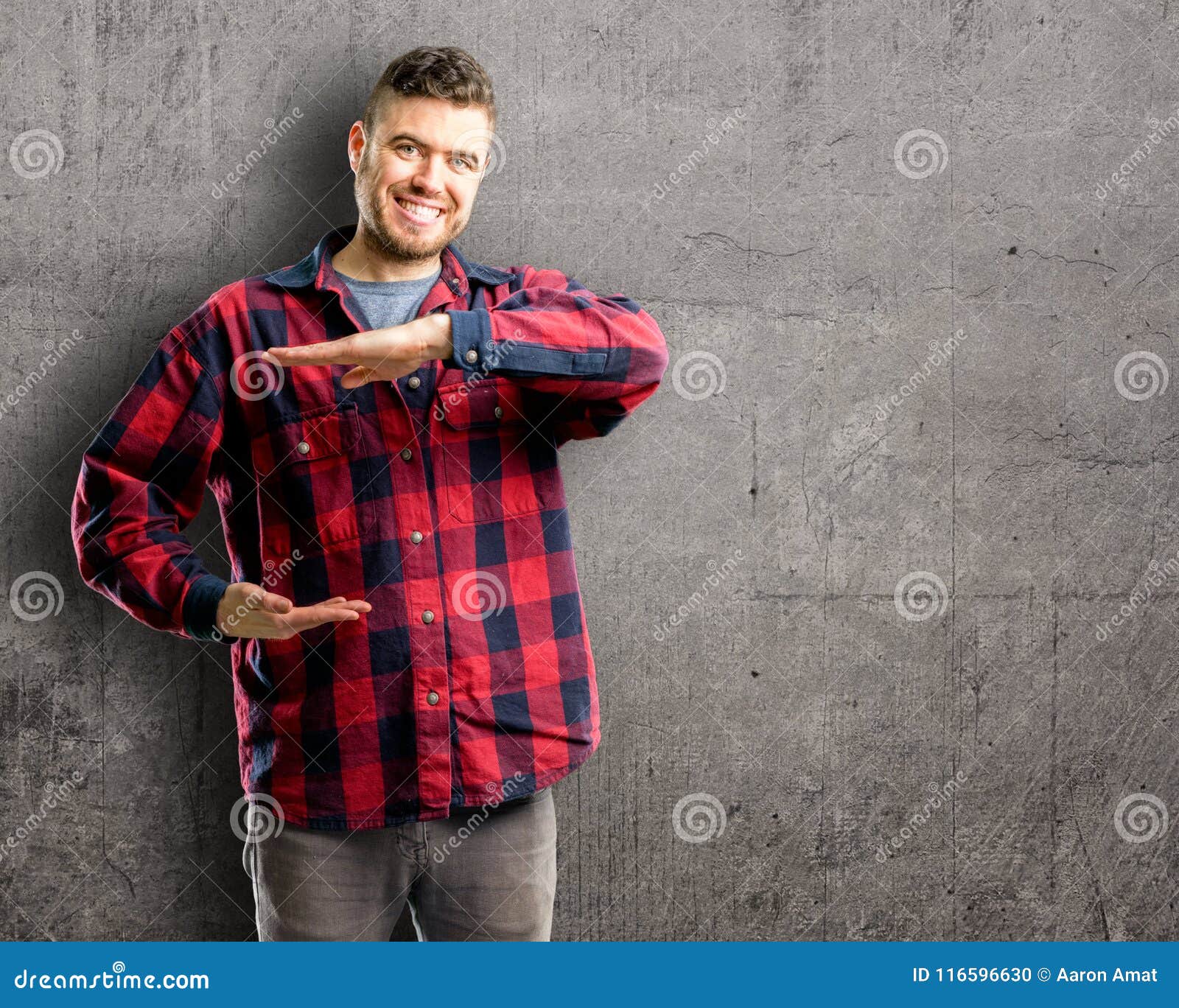 Young Handsome Man Over Wall Background Stock Photo - Image of hand ...