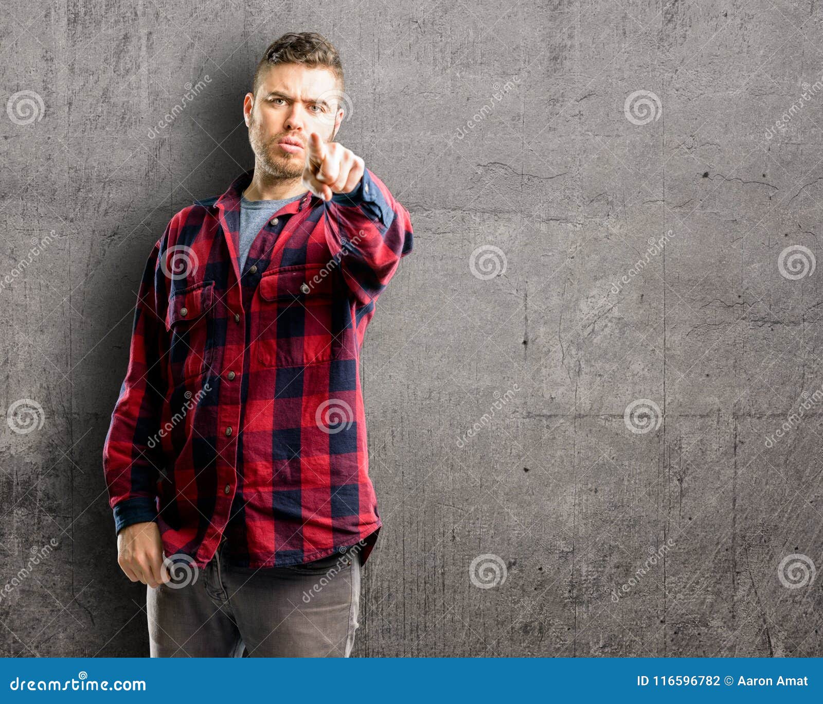 Young Handsome Man Over Wall Background Stock Photo - Image of hand ...