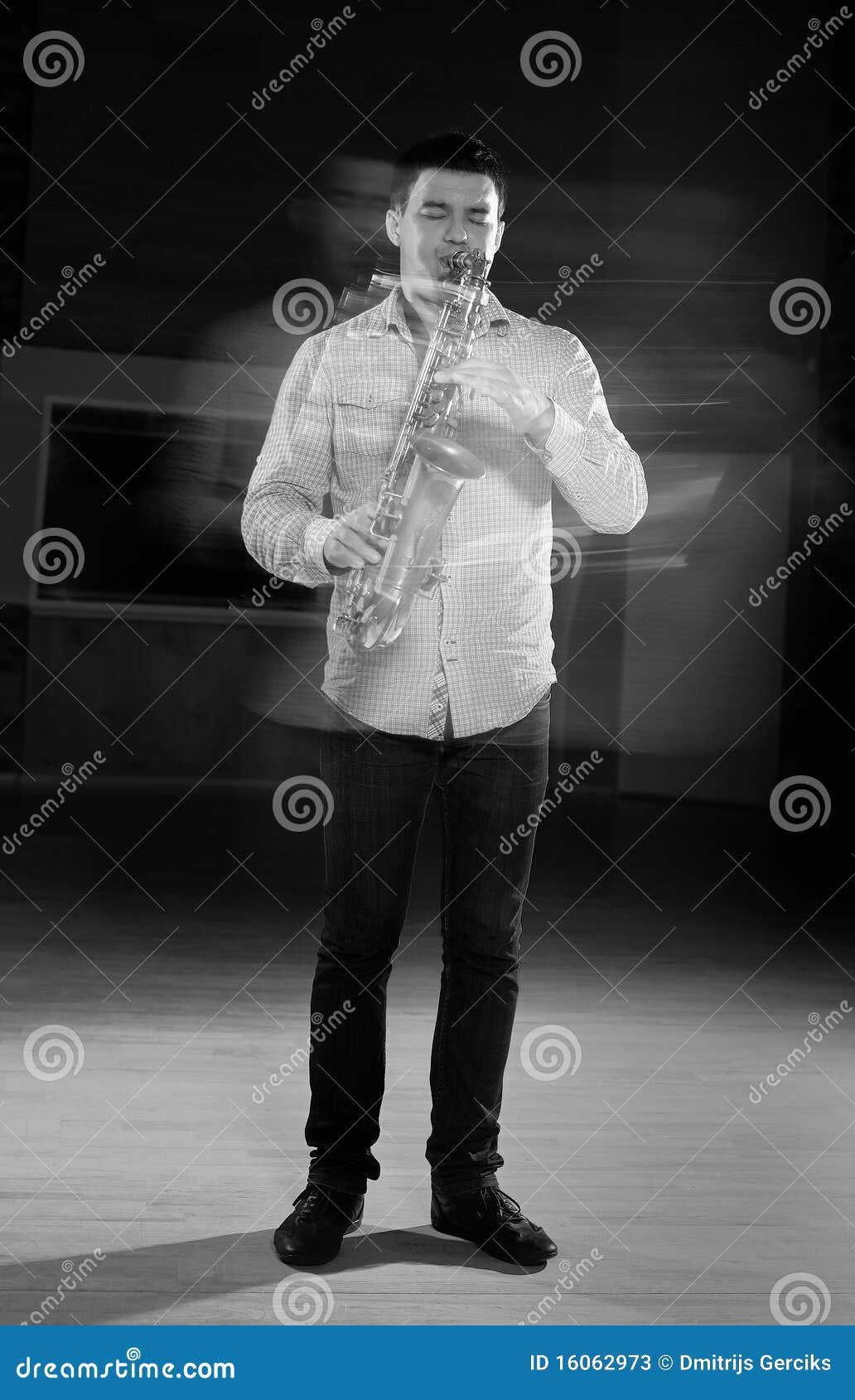 Young Handsome Man Playing Music on Saxophone Stock Image - Image of ...