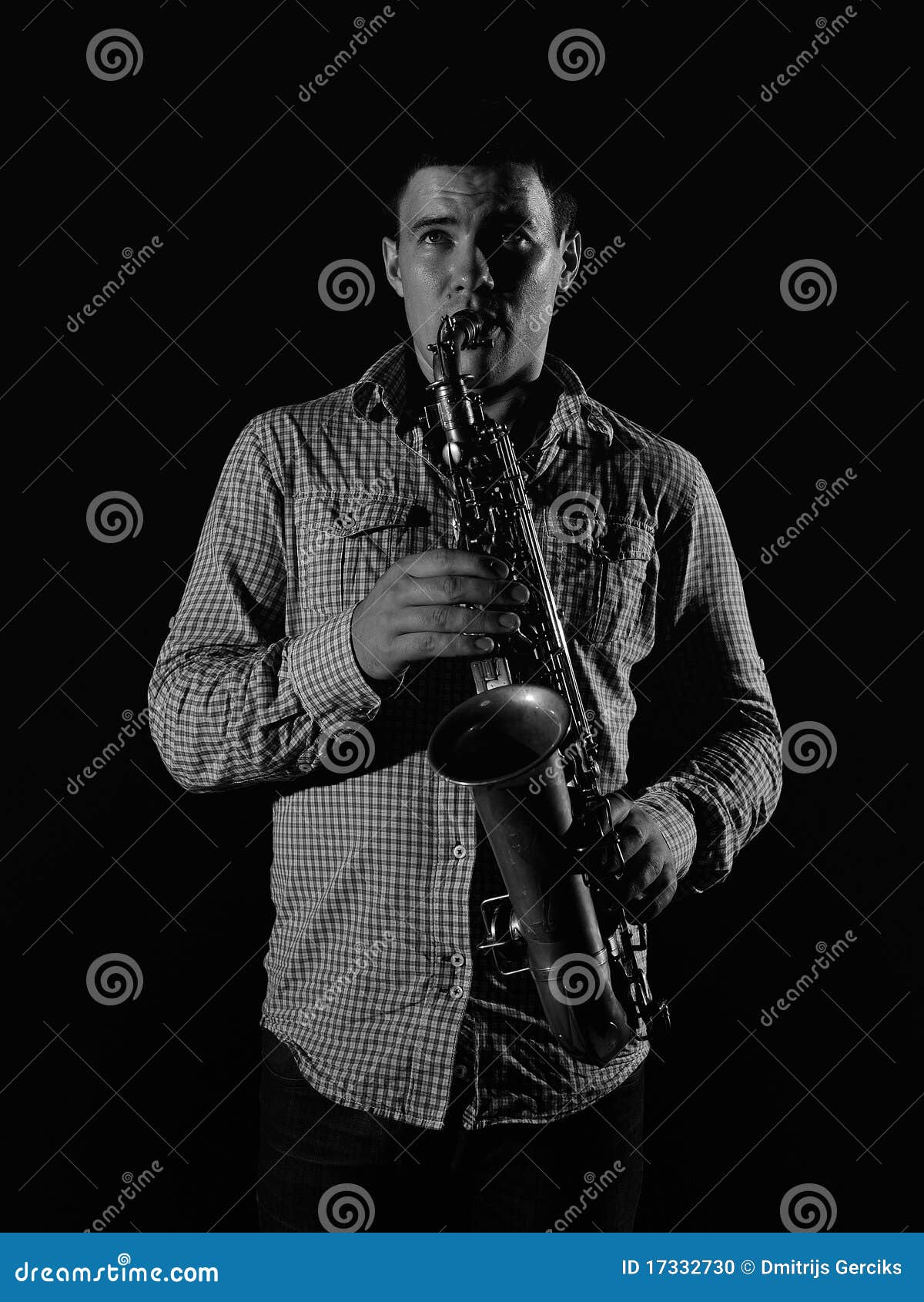 Young Handsome Man Playing Music On Saxophone Stock Photo - Image of ...