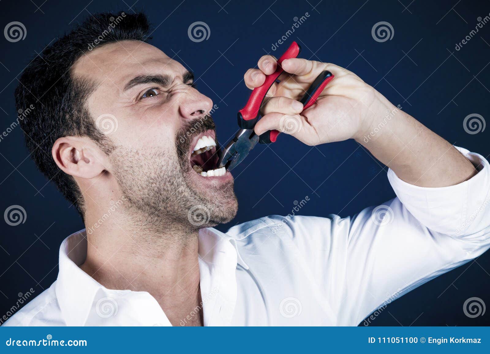 Young Handsome Man Pulling Out His Tooth Stock Photo - Image of ...