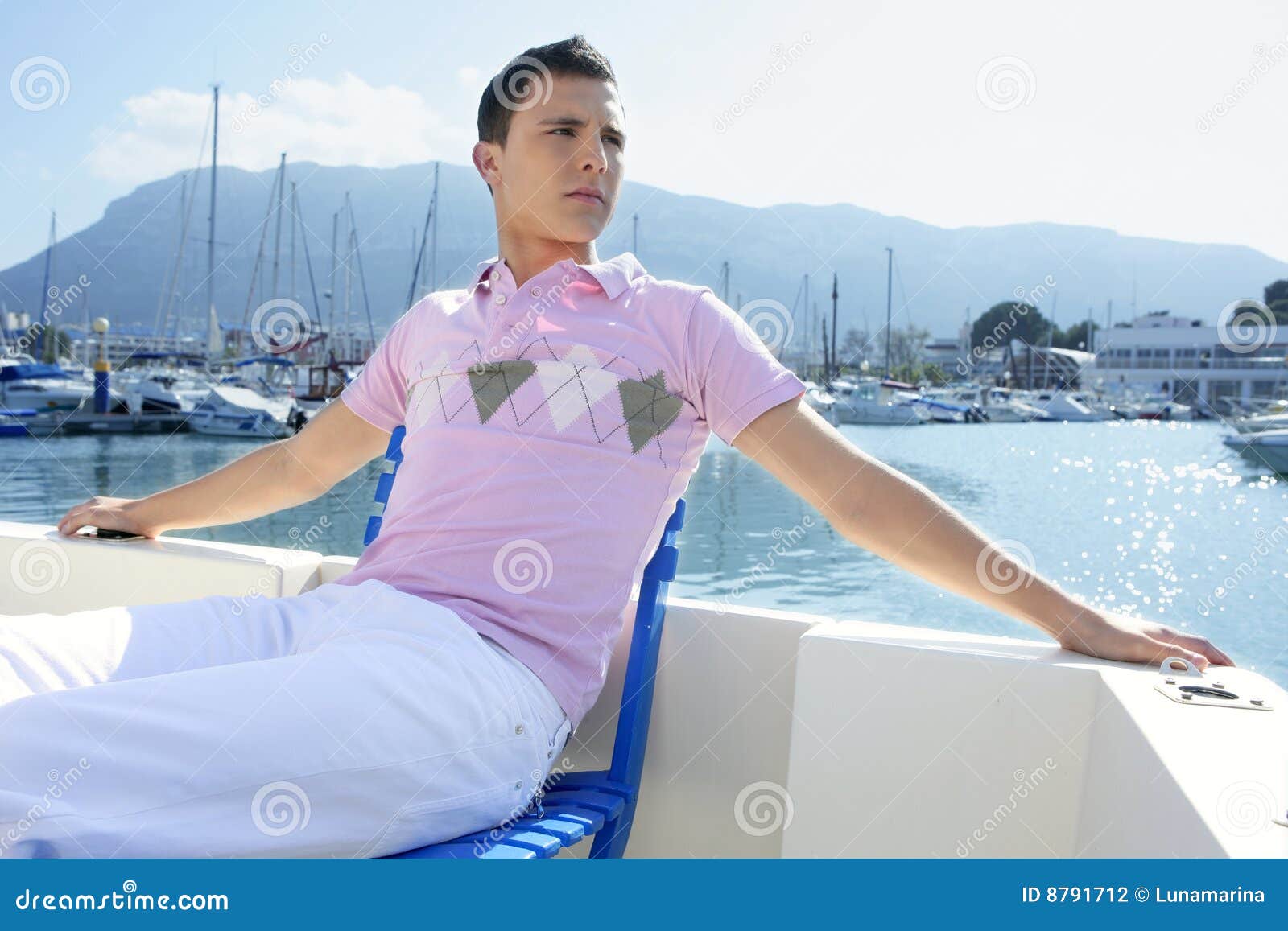Young Handsome Man Relaxed on a Boat Stock Photo - Image of background ...
