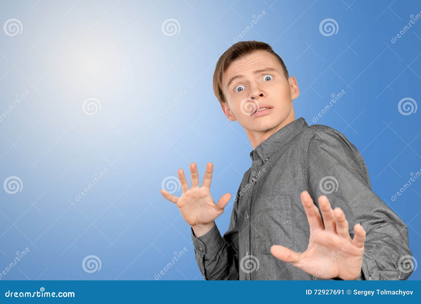 Young handsome man scared stock image. Image of amazed - 72927691