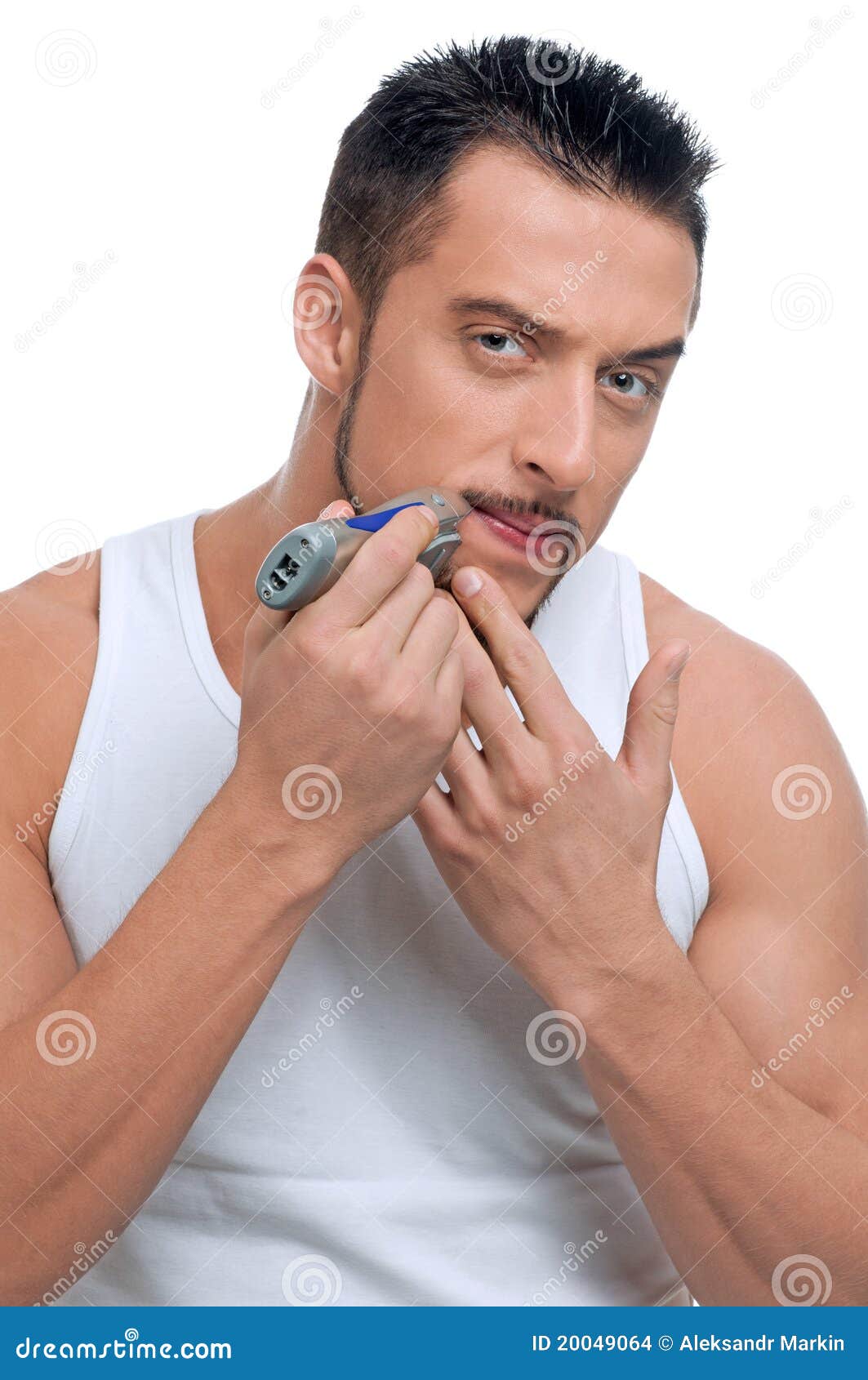 Young handsome man shaving stock photo. Image of casual - 20049064