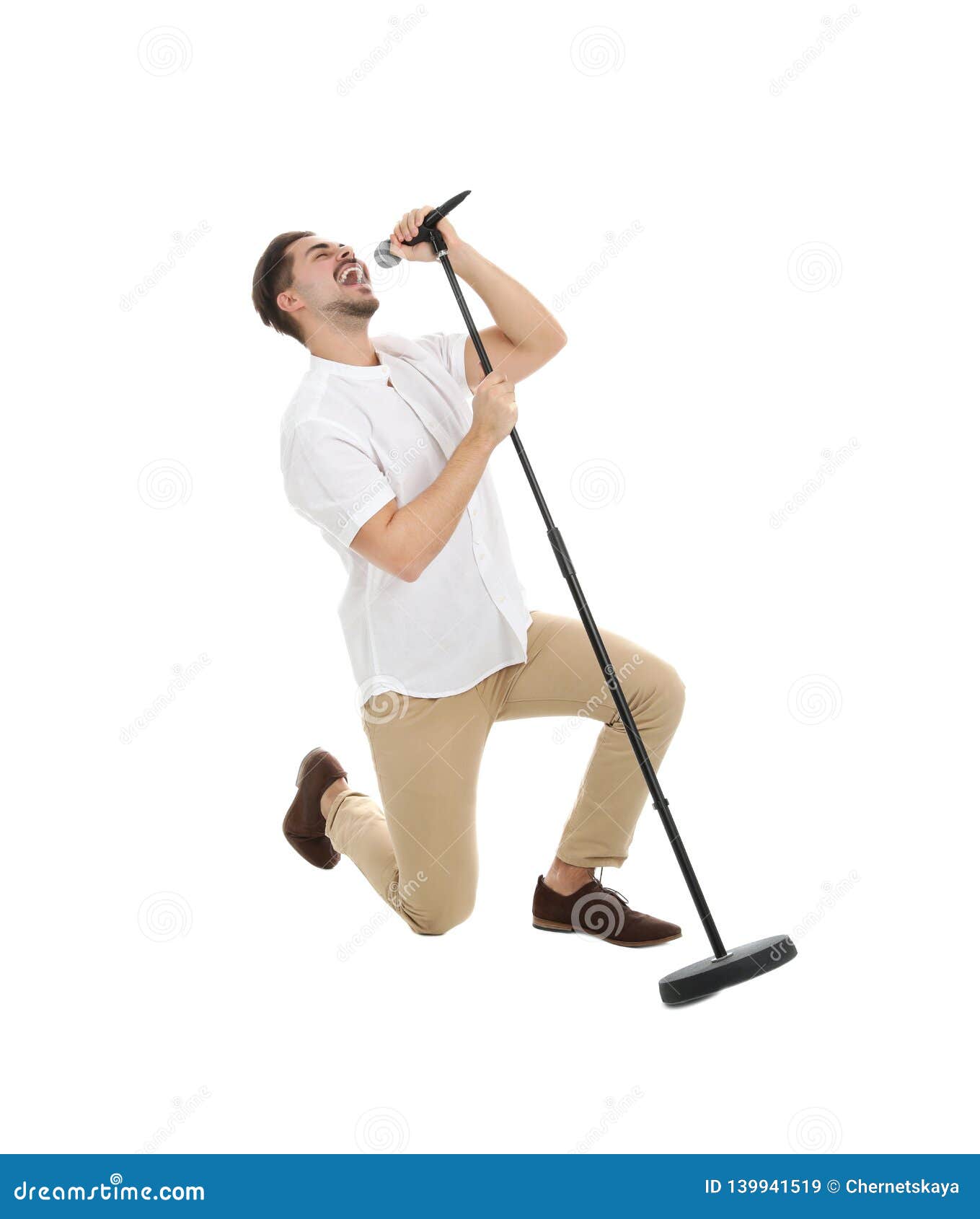 Young Handsome Man Singing in Microphone Stock Image - Image of karaoke ...