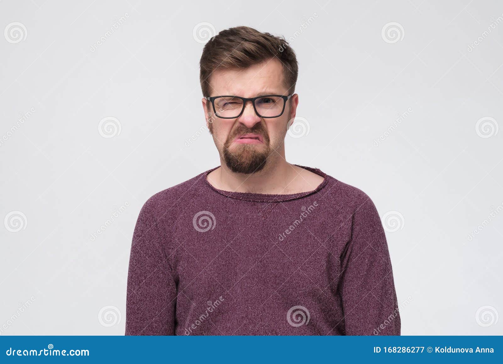 Young Handsome Man is Skeptic and Nervous, Frowning Upset because of ... Young Handsome Man is Skeptic and Nervous, Frowning Upset because of ...