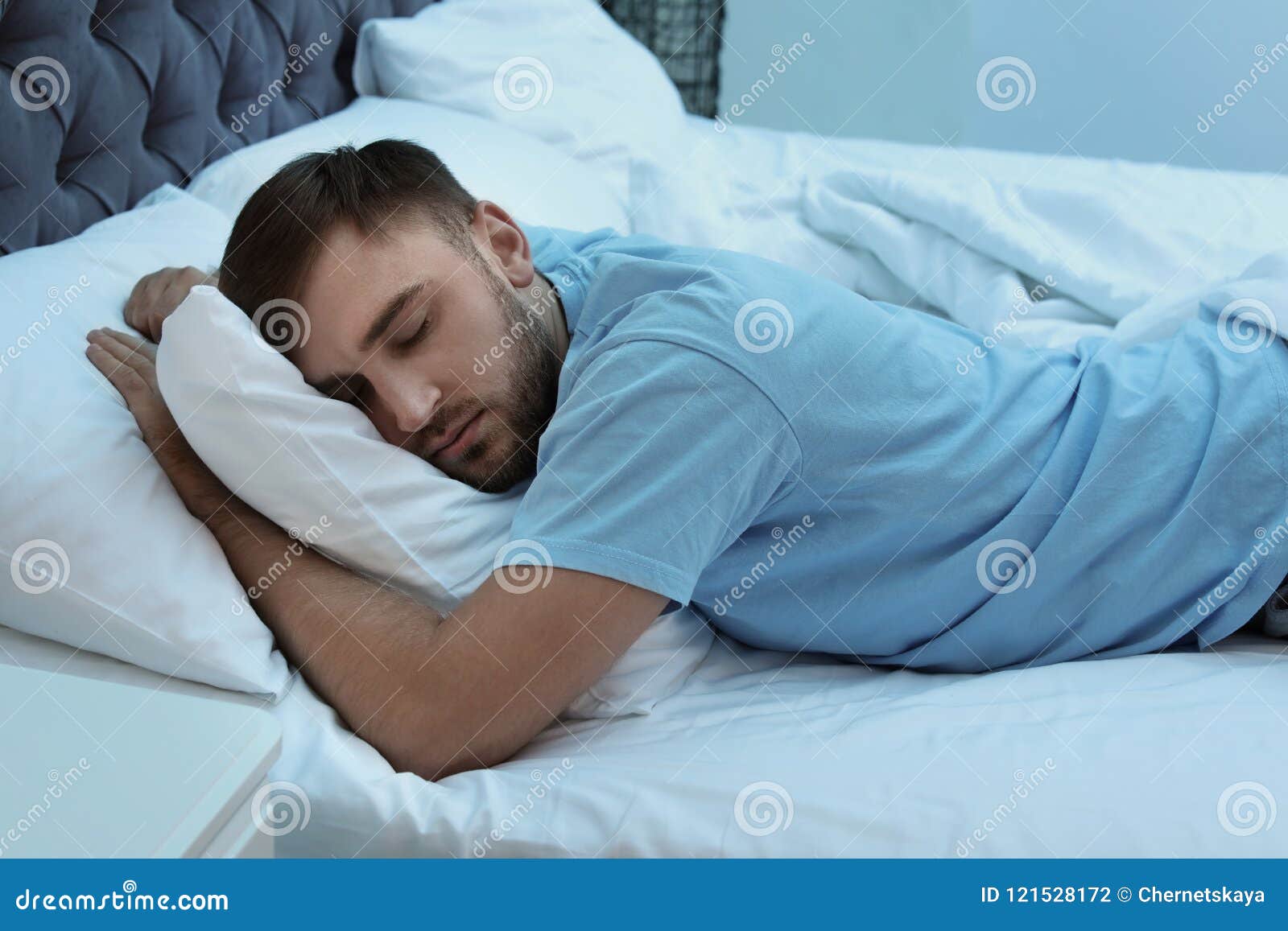 Young Handsome Man Sleeping in Bed Stock Photo - Image of dark, dream ...