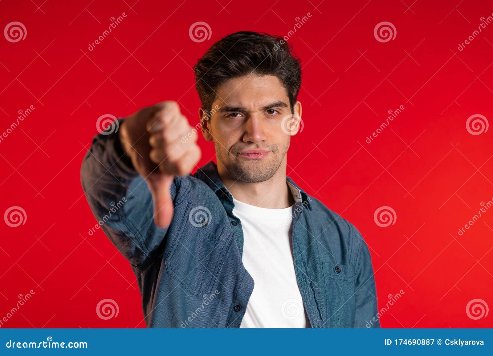 Young Handsome Man Standing on Red Studio Background Expressing ...