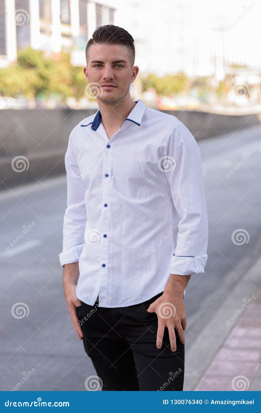 Young Handsome Man Standing and Waiting on the Side of Street Stock ...