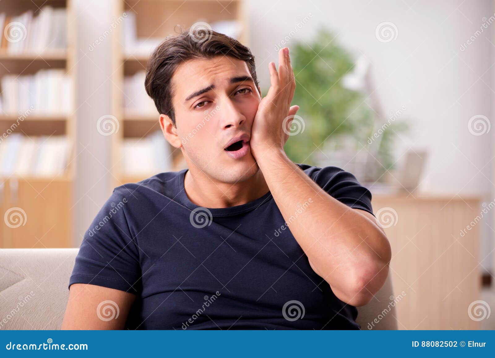 The Young Handsome Man Suffering from Pain Stock Photo - Image of ...
