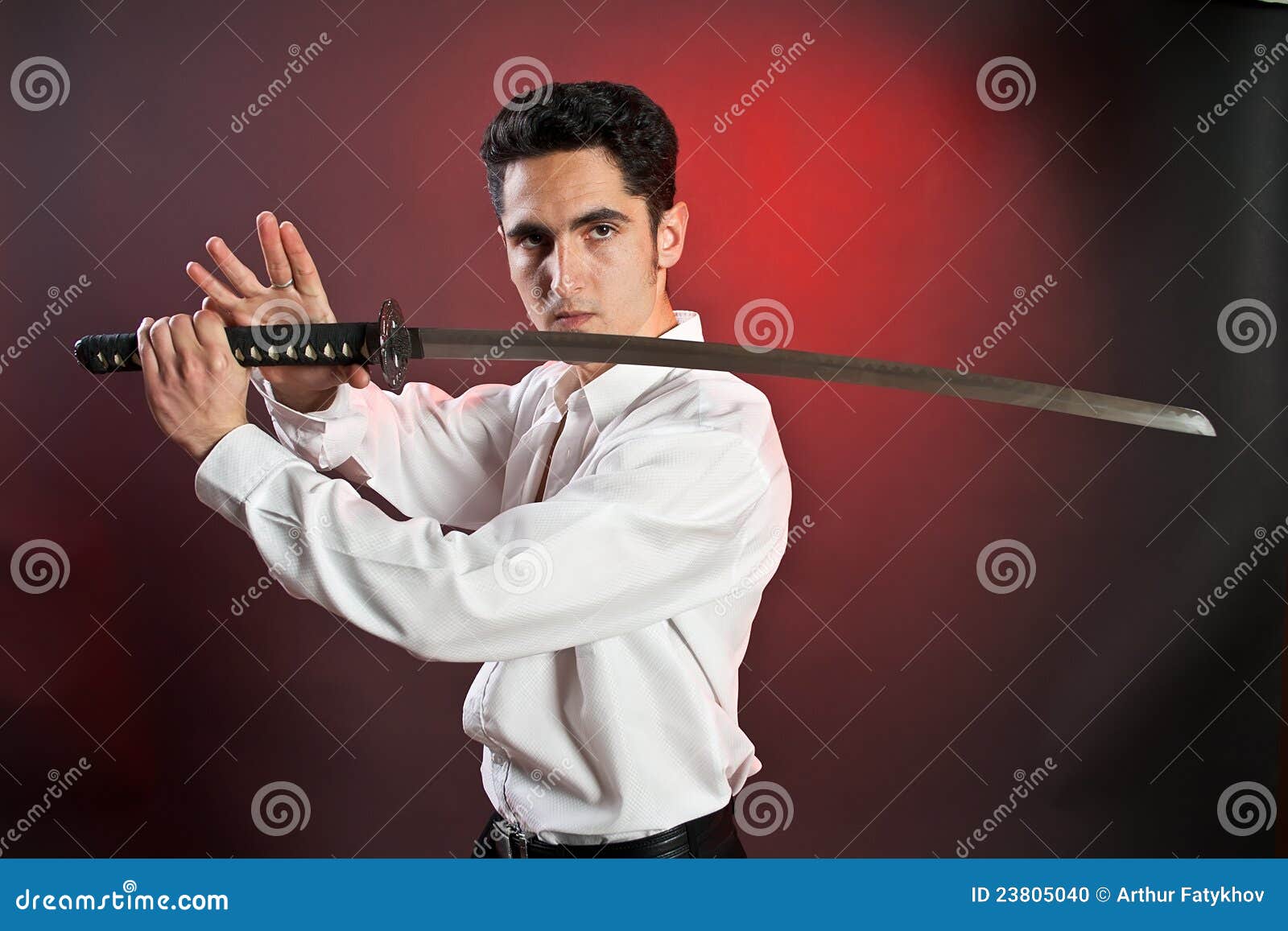 Young Handsome Man with Sword. Stock Photo - Image of trendy, stubble ...