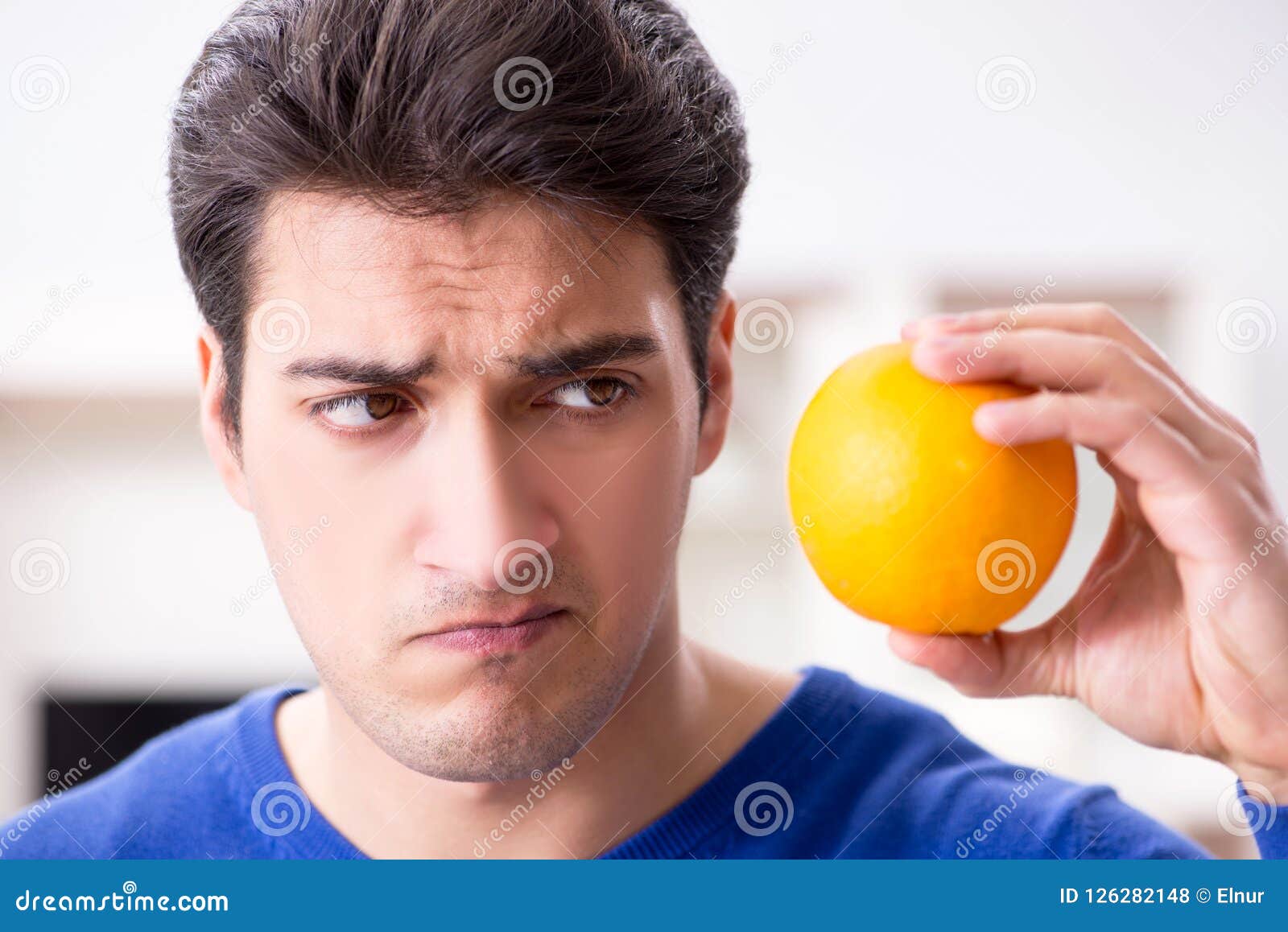 The Young Handsome Man Taking Care of Face Skin Stock Photo - Image of ...