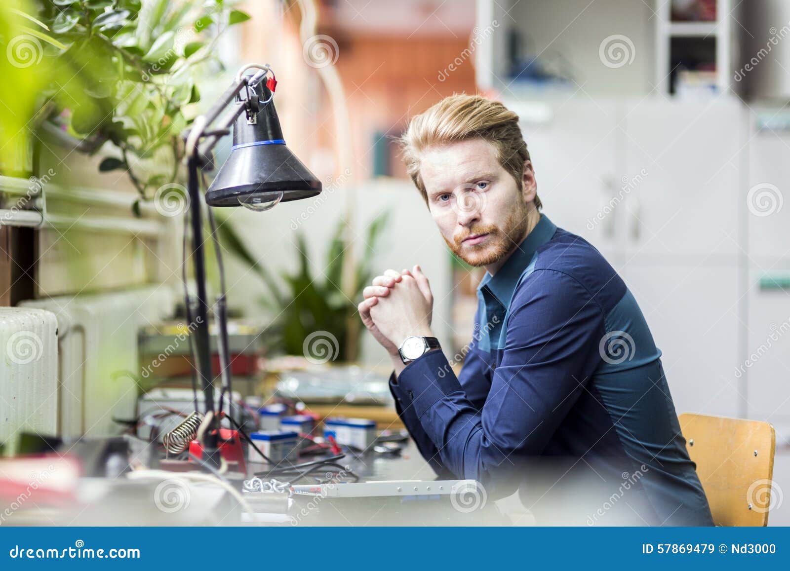 Young Handsome Man Thinking How To Solder the Circuit Board Stock Image ...