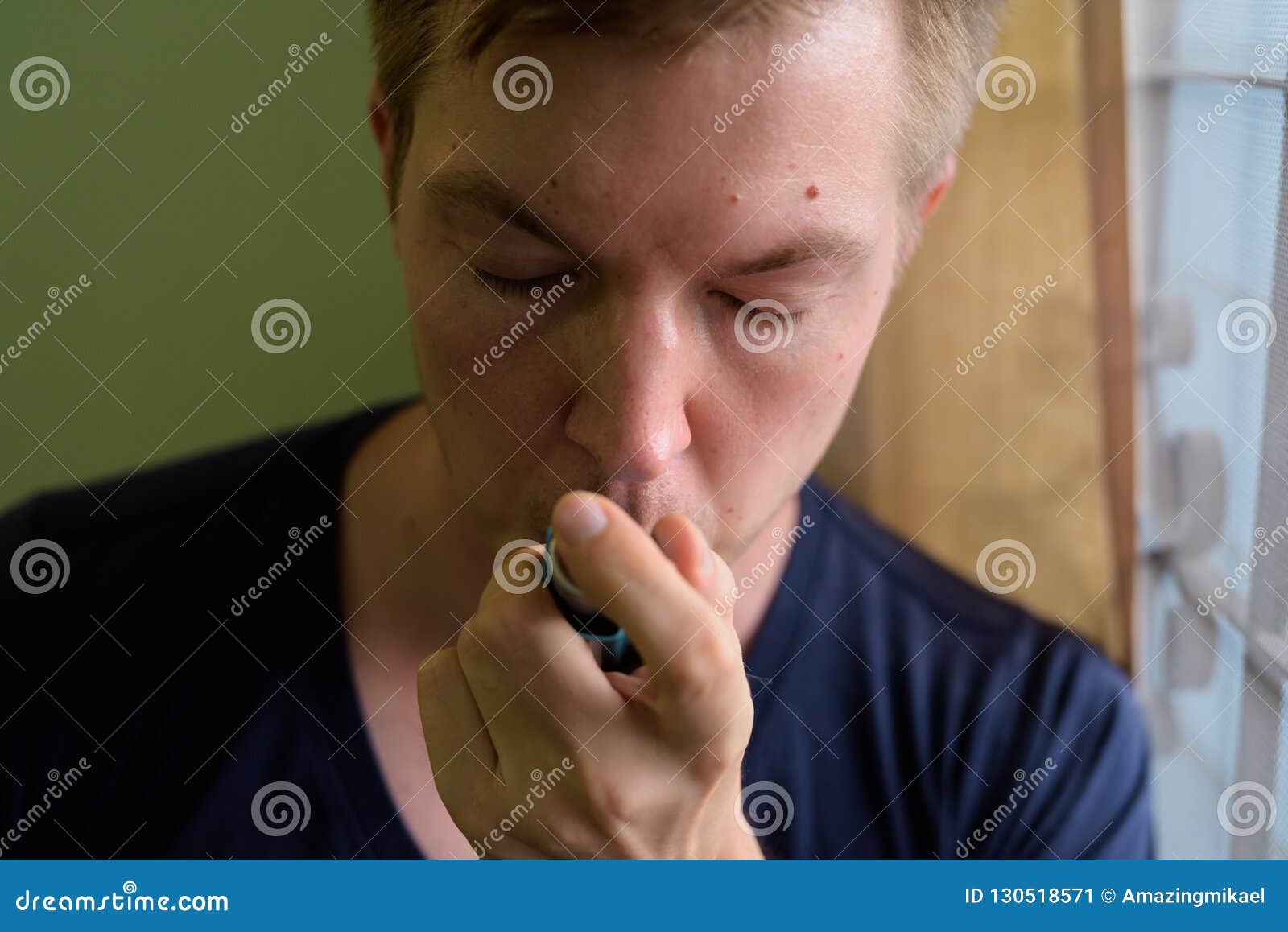 Young Handsome Man Using Asthma Inhaler at Home Stock Image - Image of ...