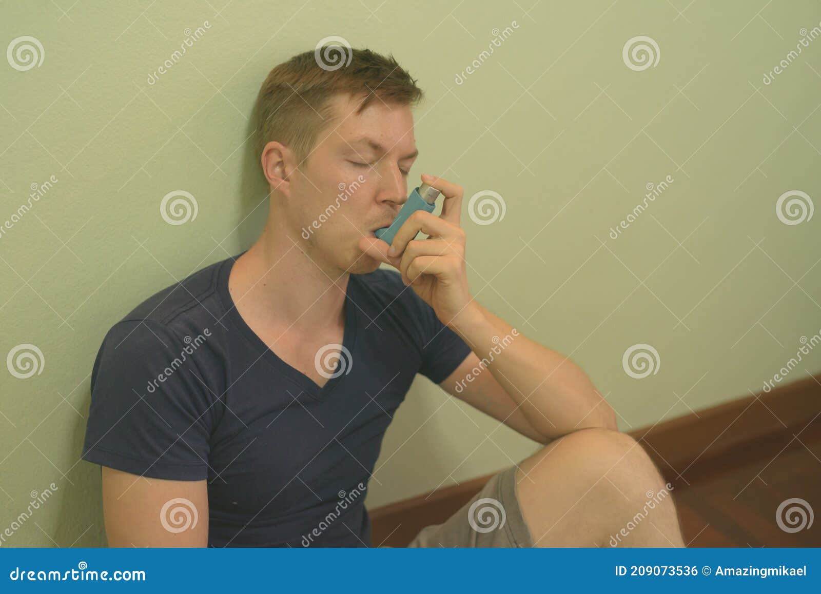 Young Handsome Man Using Asthma Inhaler at Home Stock Photo - Image of ...