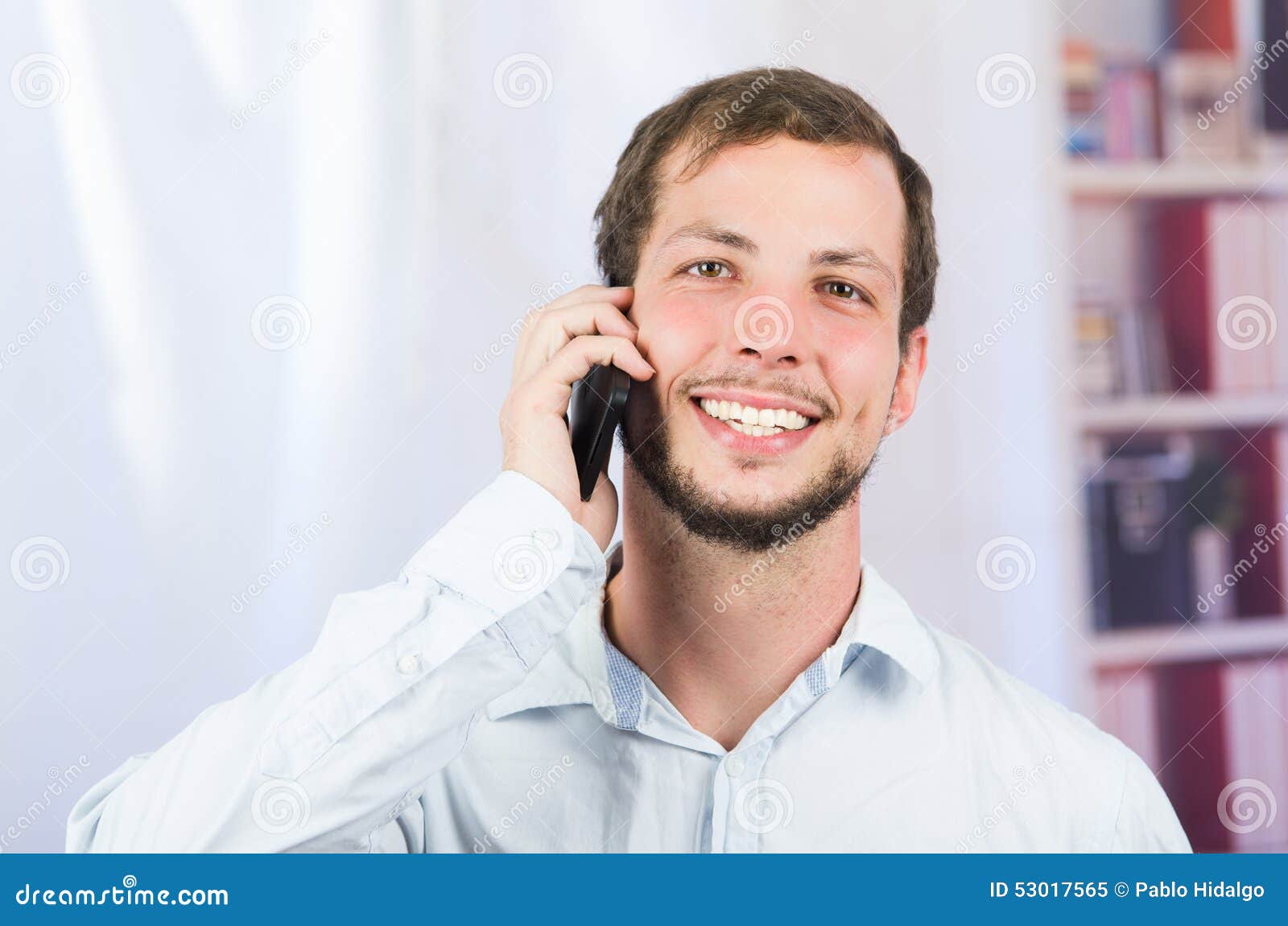 Young Handsome Man Using Cell Phone Stock Image - Image of male ...