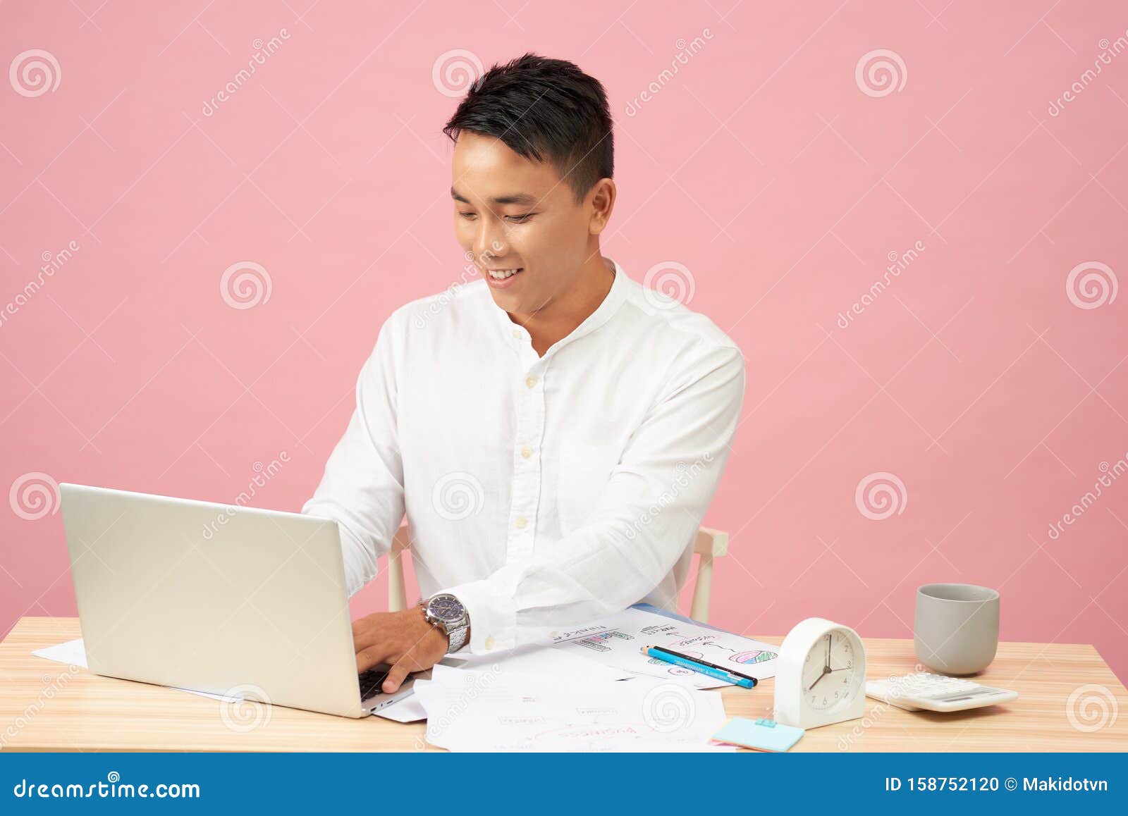 Young Handsome Man Using Laptop in His Office.Asian Stock Photo - Image ...