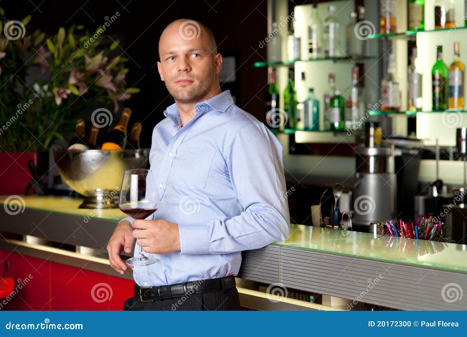 Young Handsome Man Waiting Next To the Bar Stock Photo - Image of drink ...