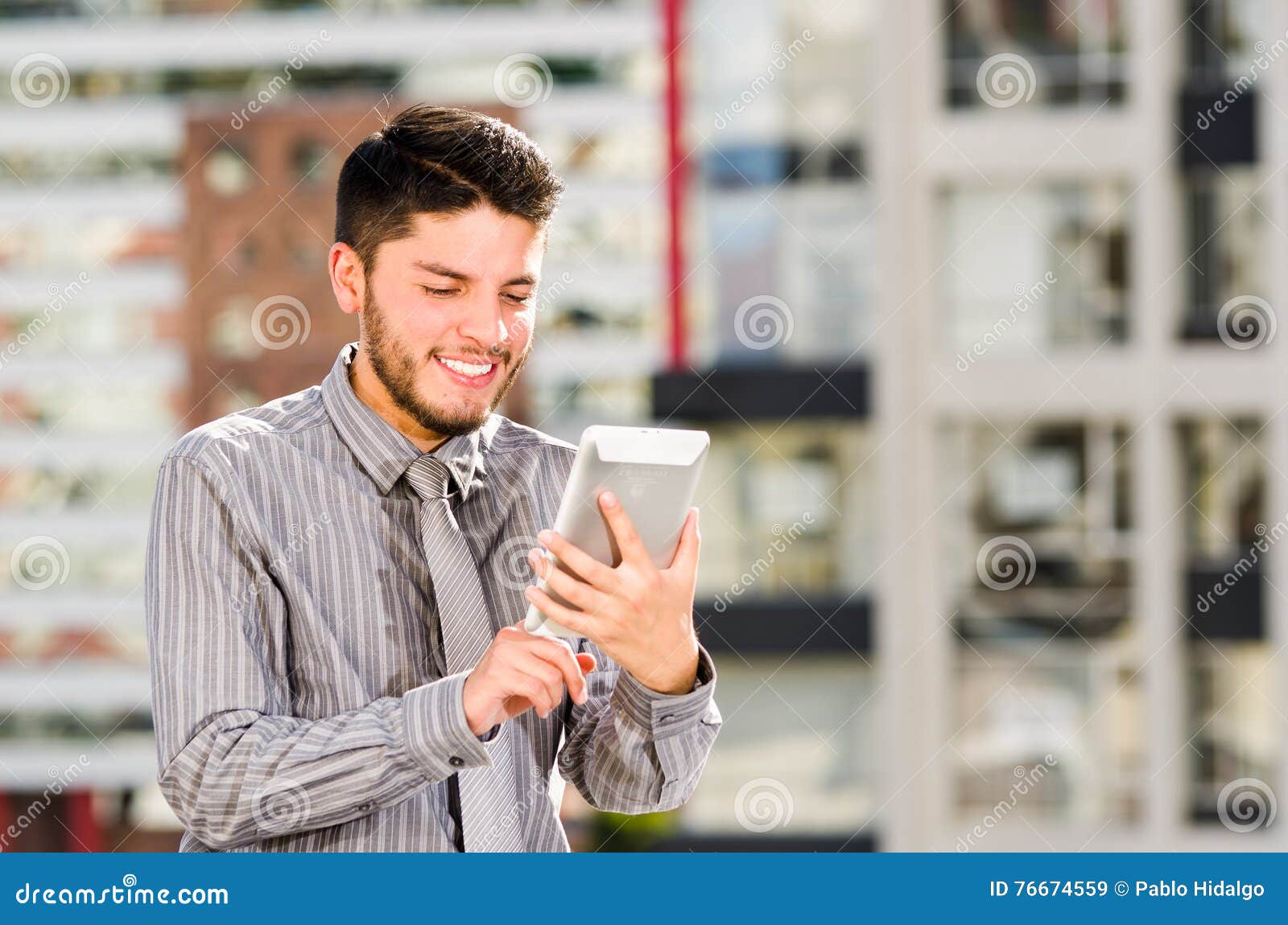 Young Handsome Man Wearing Shirt And Tie Standing On Rooftop Holding