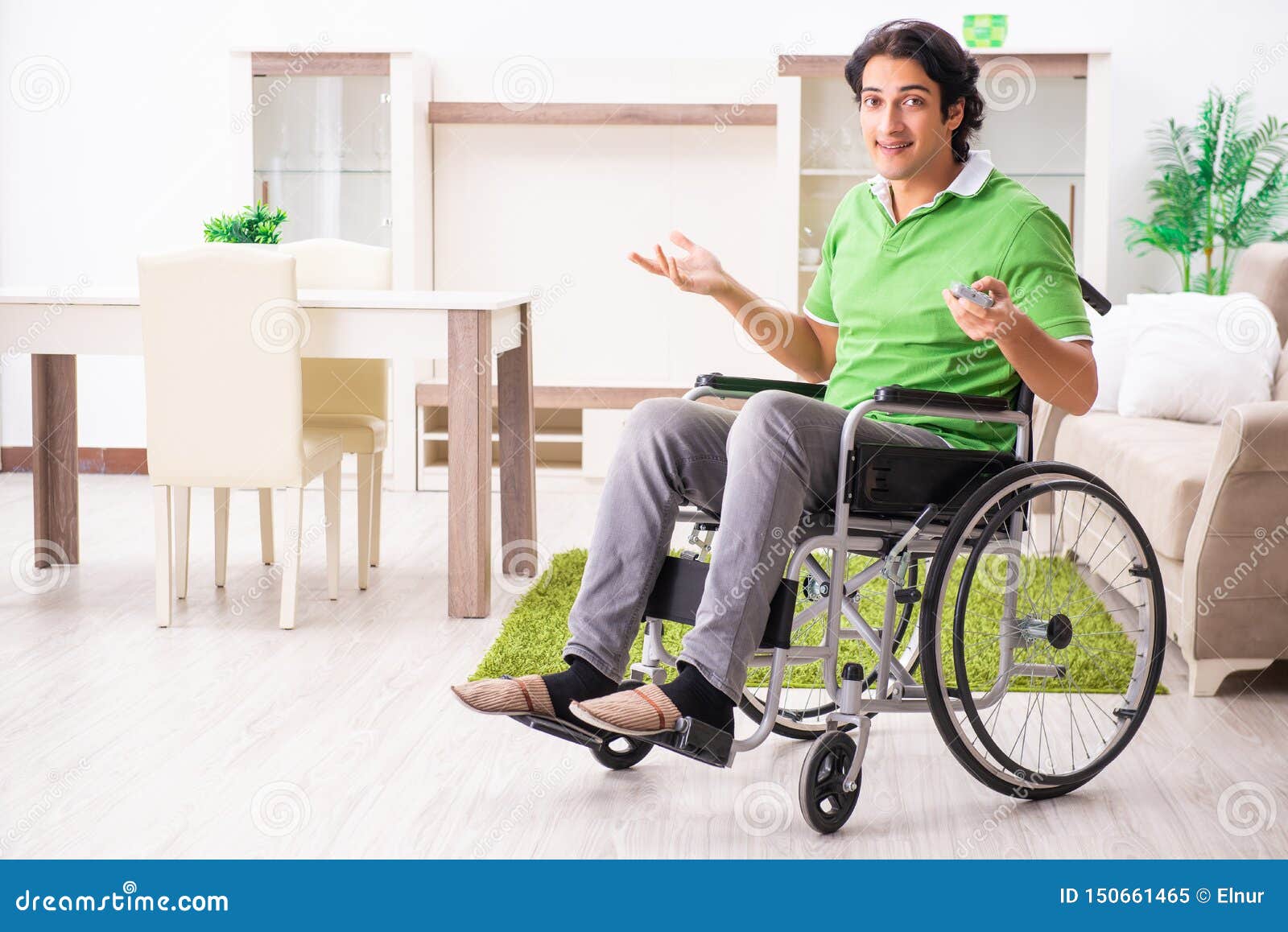 The Young Handsome Man in Wheelchair at Home Stock Image - Image of ...