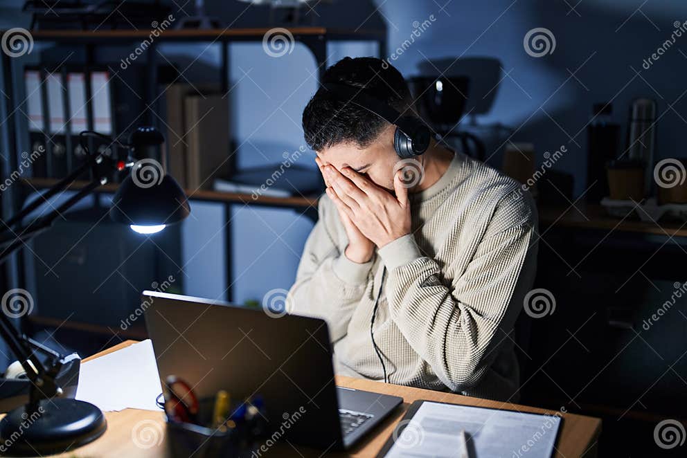 Young Handsome Man Working Using Computer Laptop at Night with Sad ...
