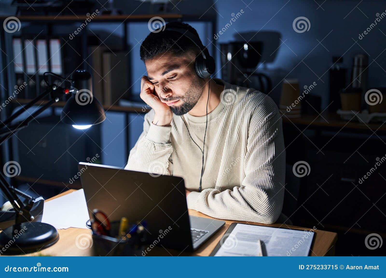 Young Handsome Man Working Using Computer Laptop at Night Thinking ...