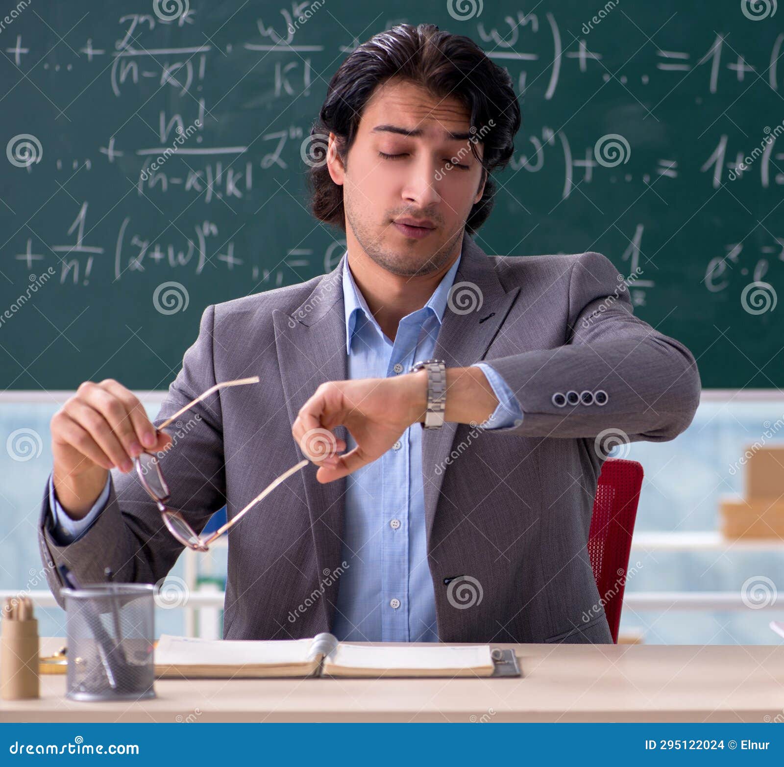 Young Handsome Math Teacher in Classroom Stock Photo - Image of ...