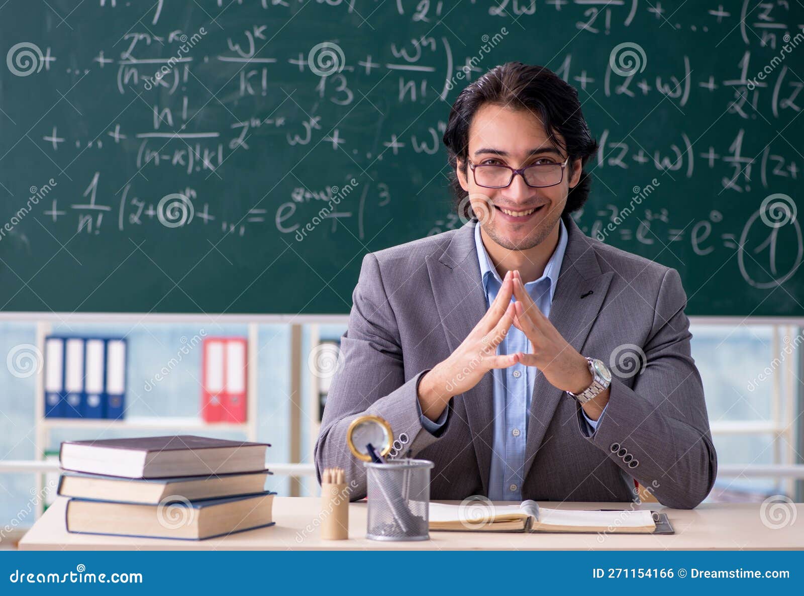 Young Handsome Math Teacher in Classroom Stock Photo - Image of lesson ...