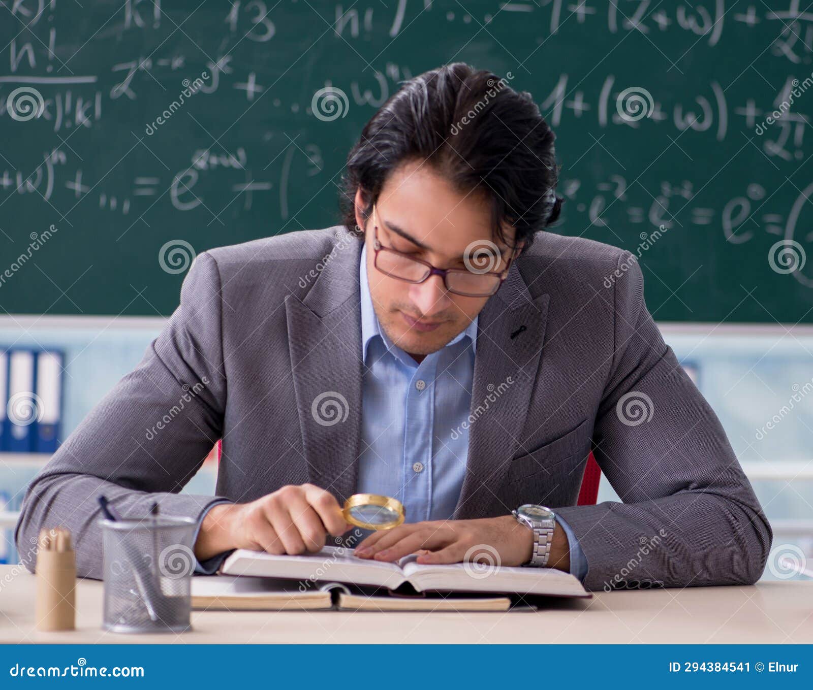 Young Handsome Math Teacher in Classroom Stock Image - Image of ...