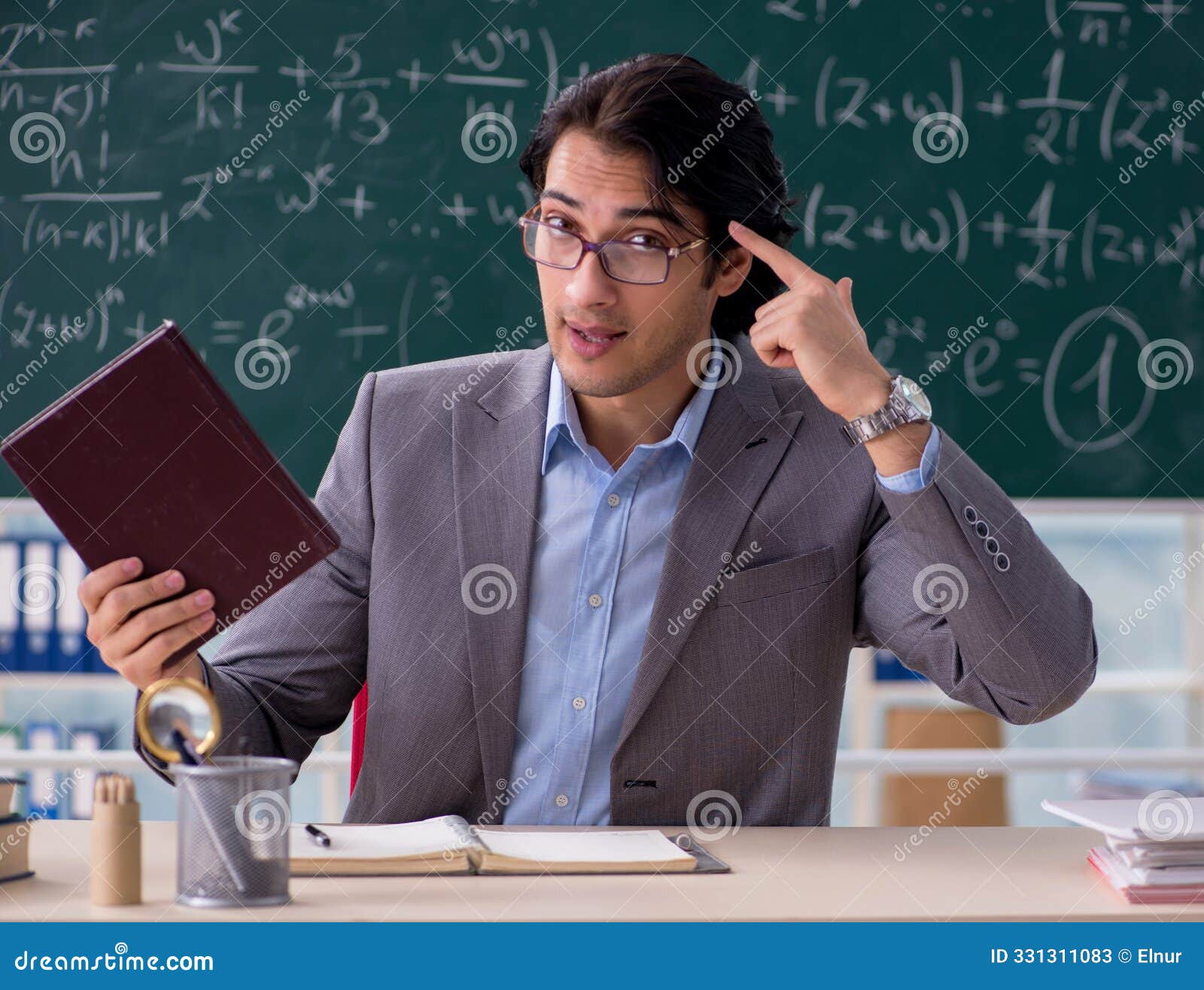 Young Handsome Math Teacher in Classroom Stock Image - Image of algebra ...