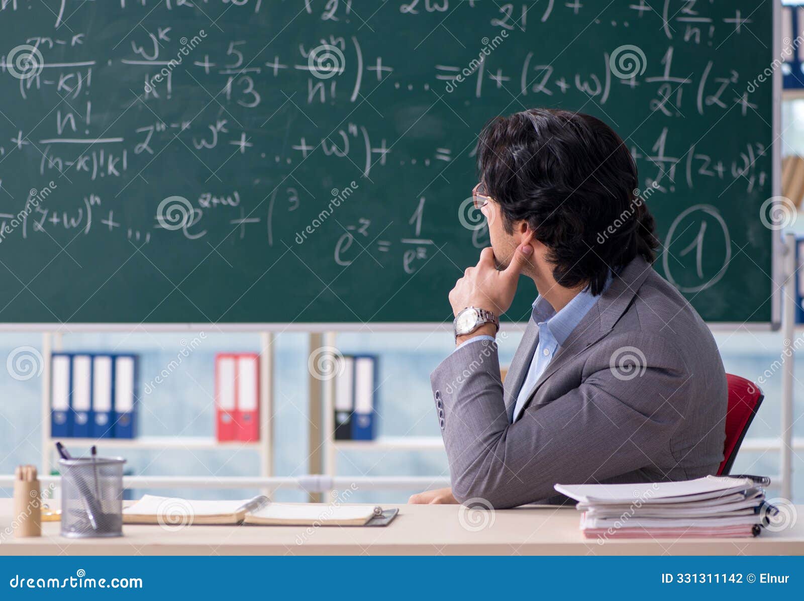 Young Handsome Math Teacher in Classroom Stock Photo - Image of ...